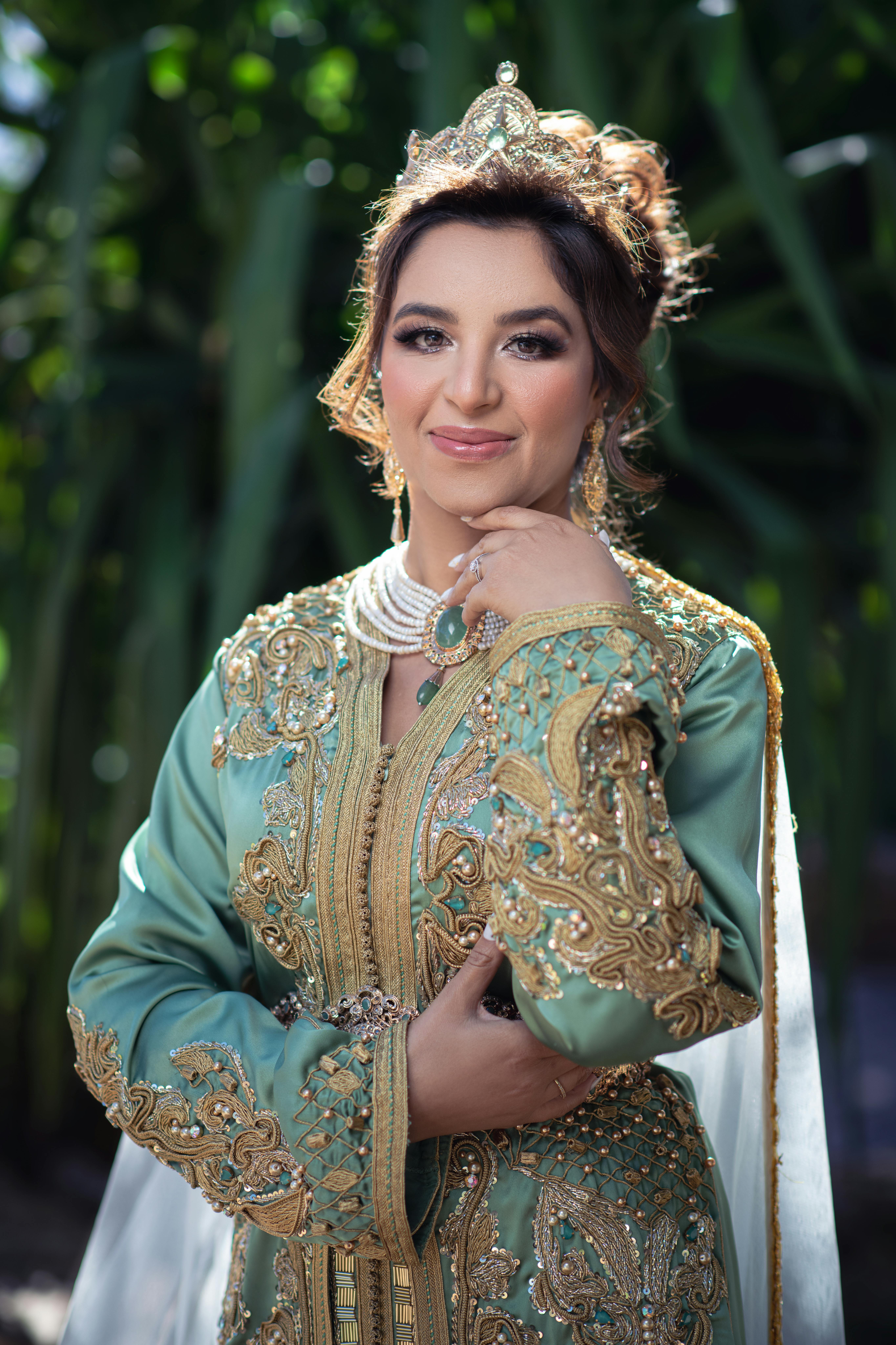 Model in a Green Patterned Dress and a Tiara · Free Stock Photo