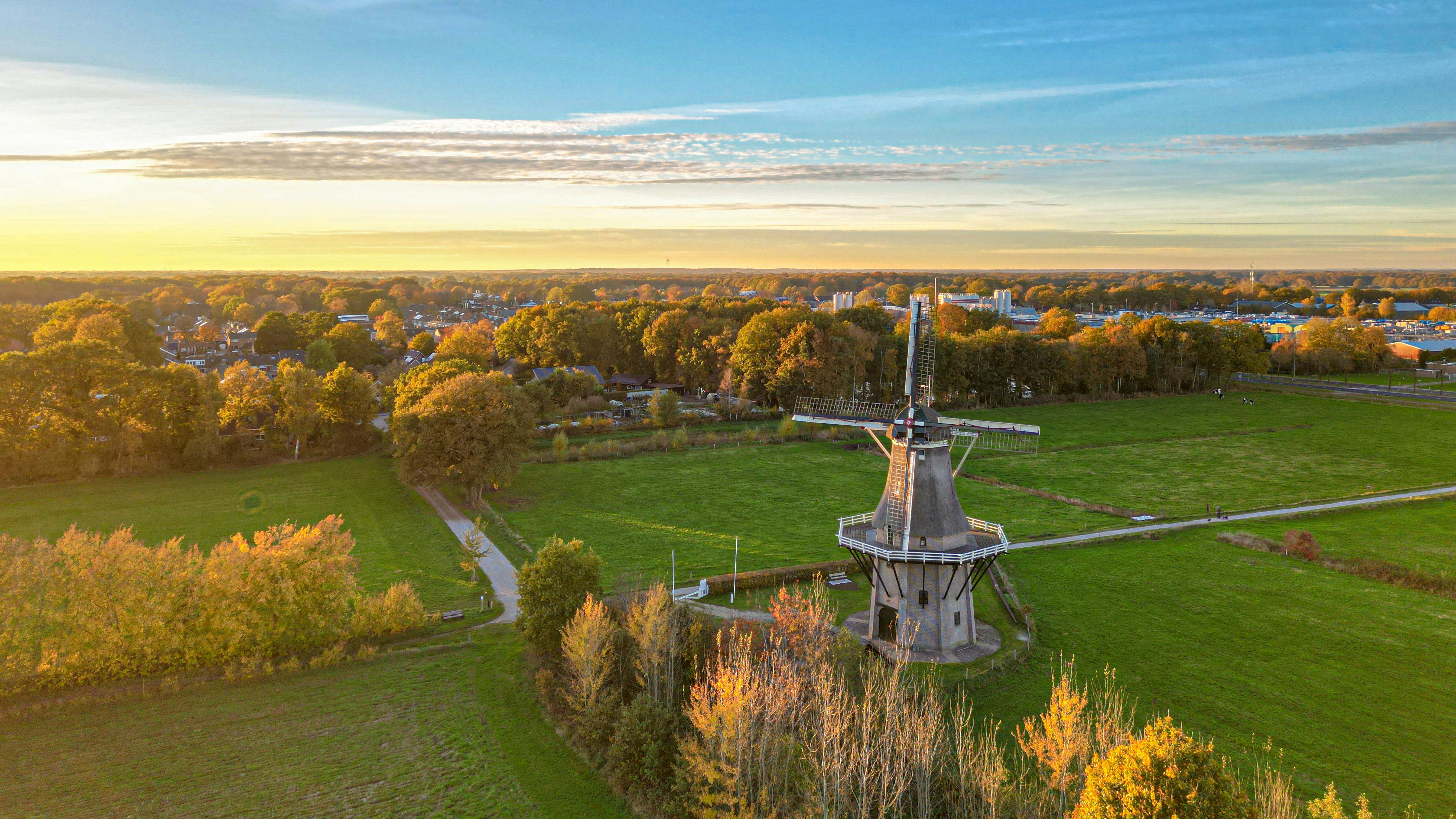 Windmill on a Field · Free Stock Photo