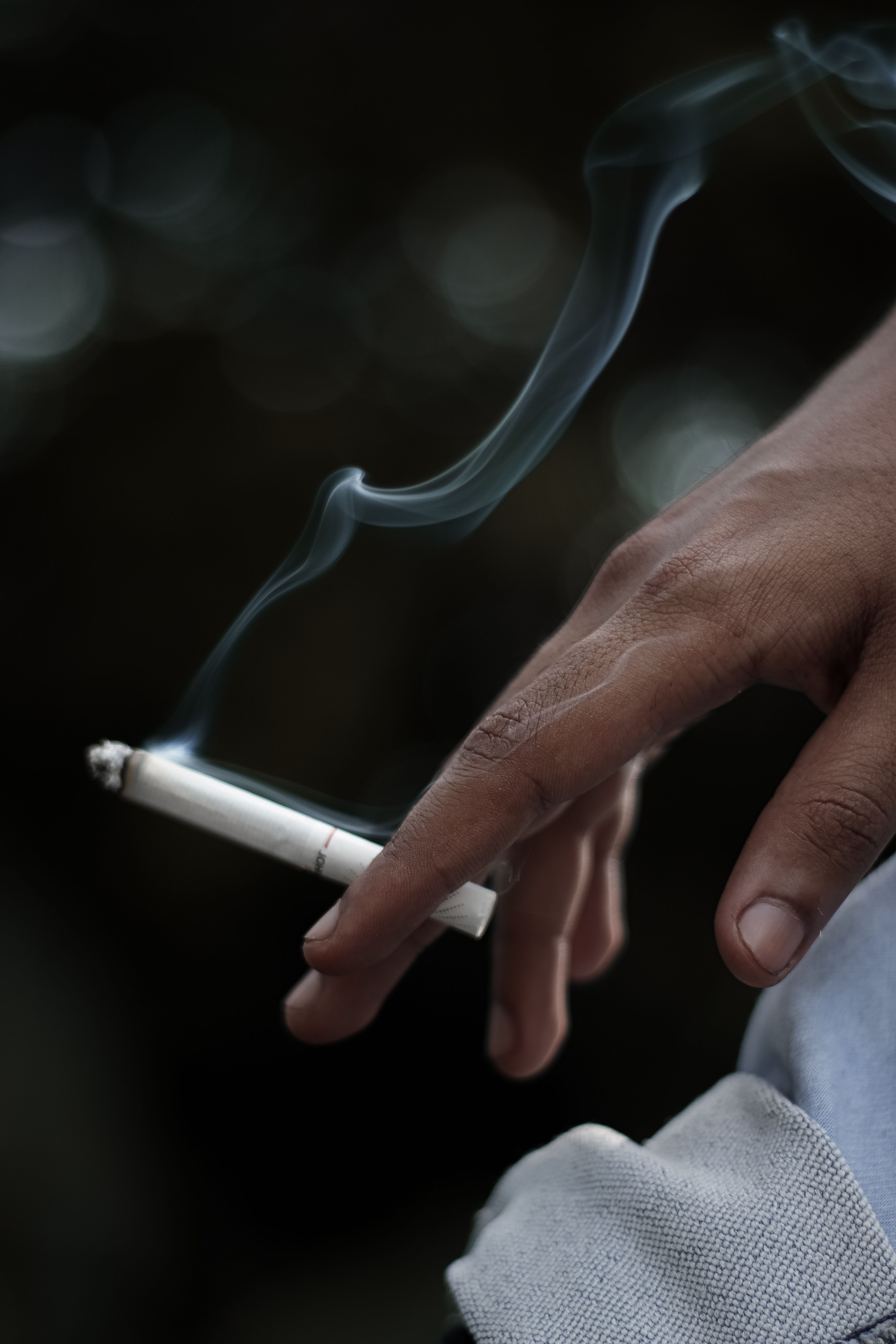 Man Smoking a Cigarette · Free Stock Photo