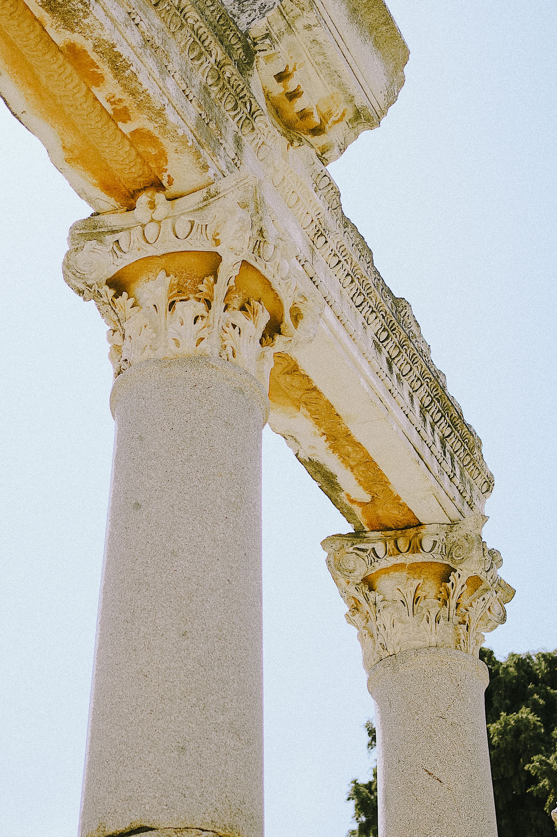 Low Angle Photo of Columns and Pillars · Free Stock Photo
