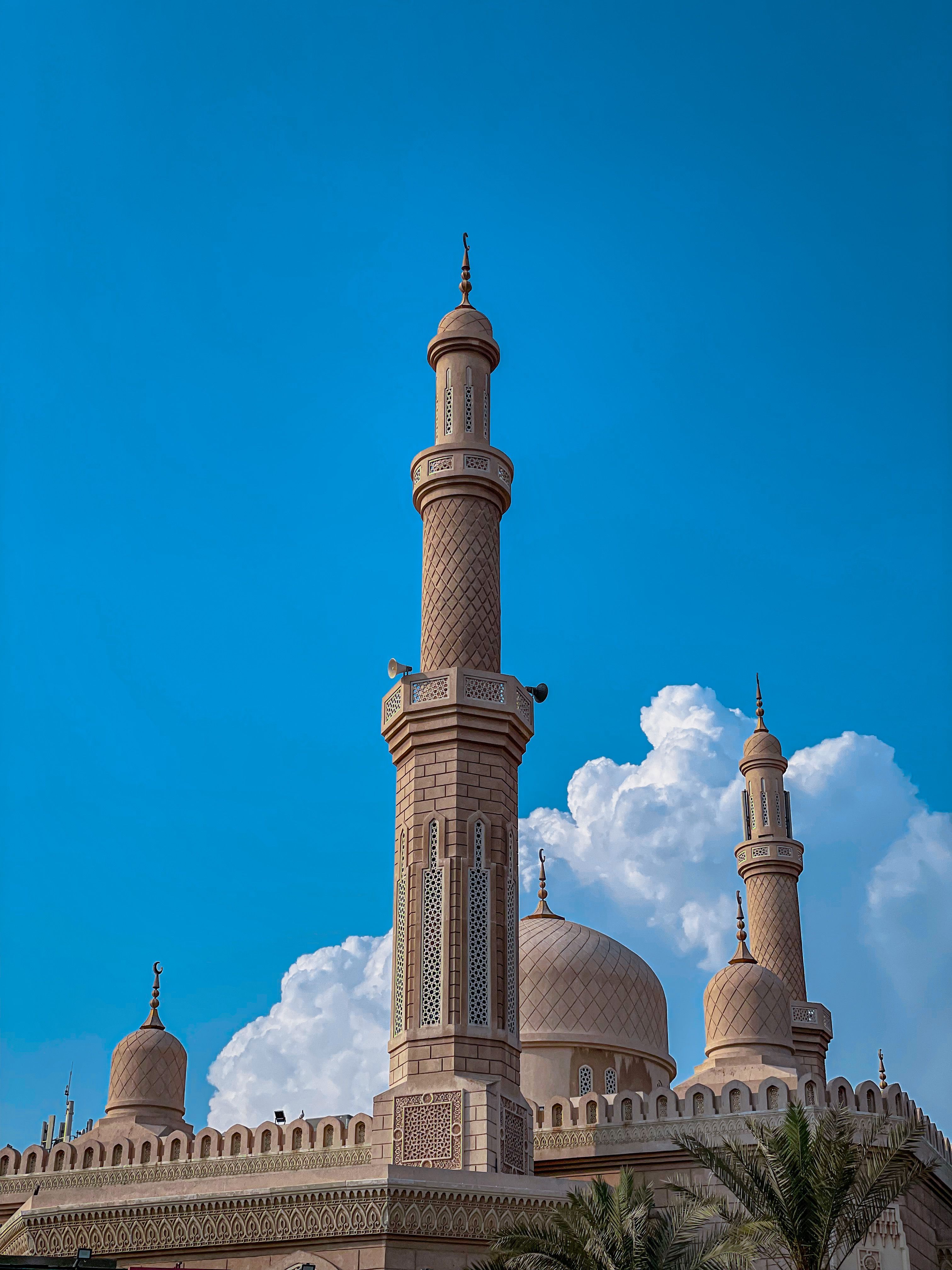 Minaret Building against Blue Sky · Free Stock Photo