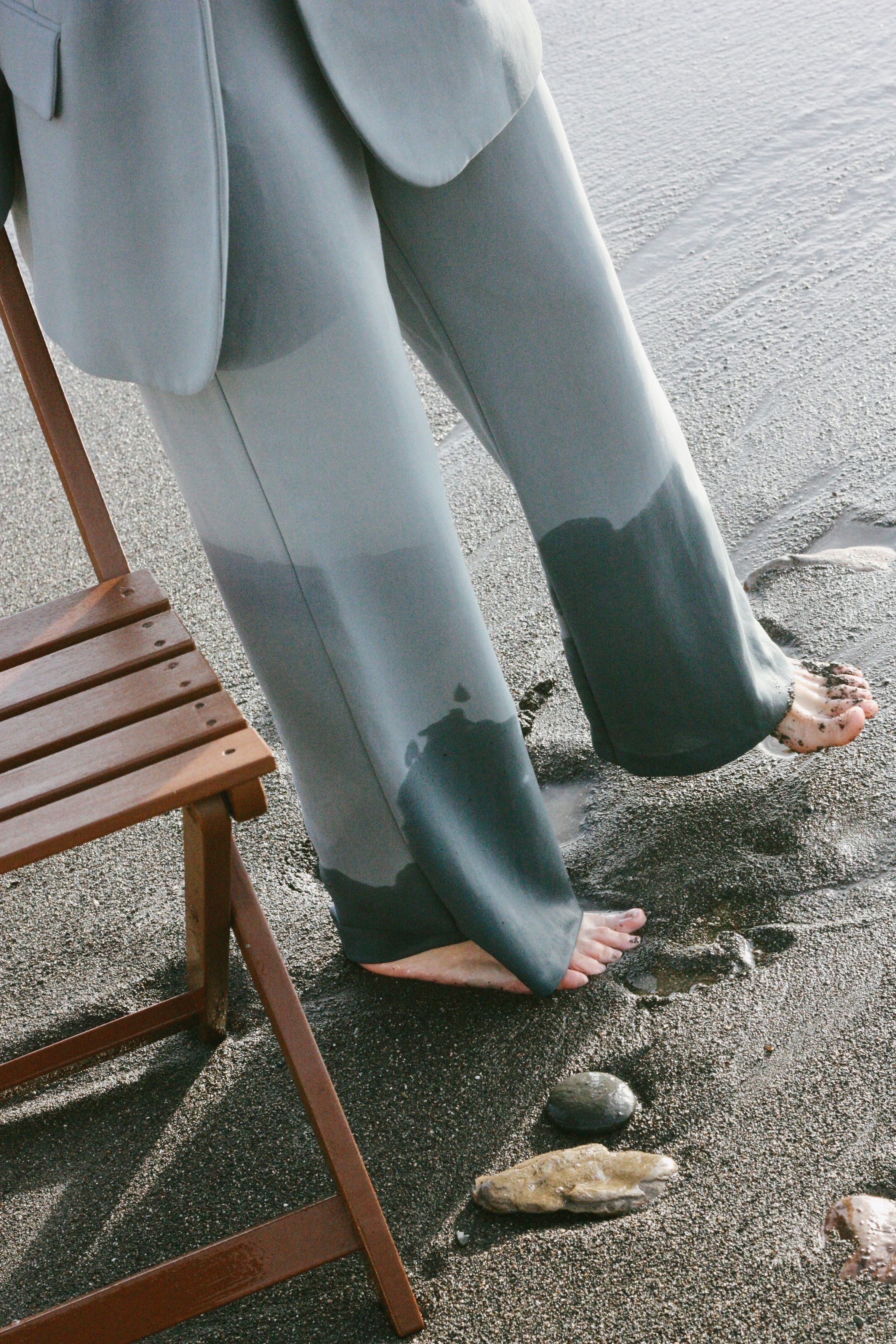 Person in Red Pants Standing on One Foot · Free Stock Photo