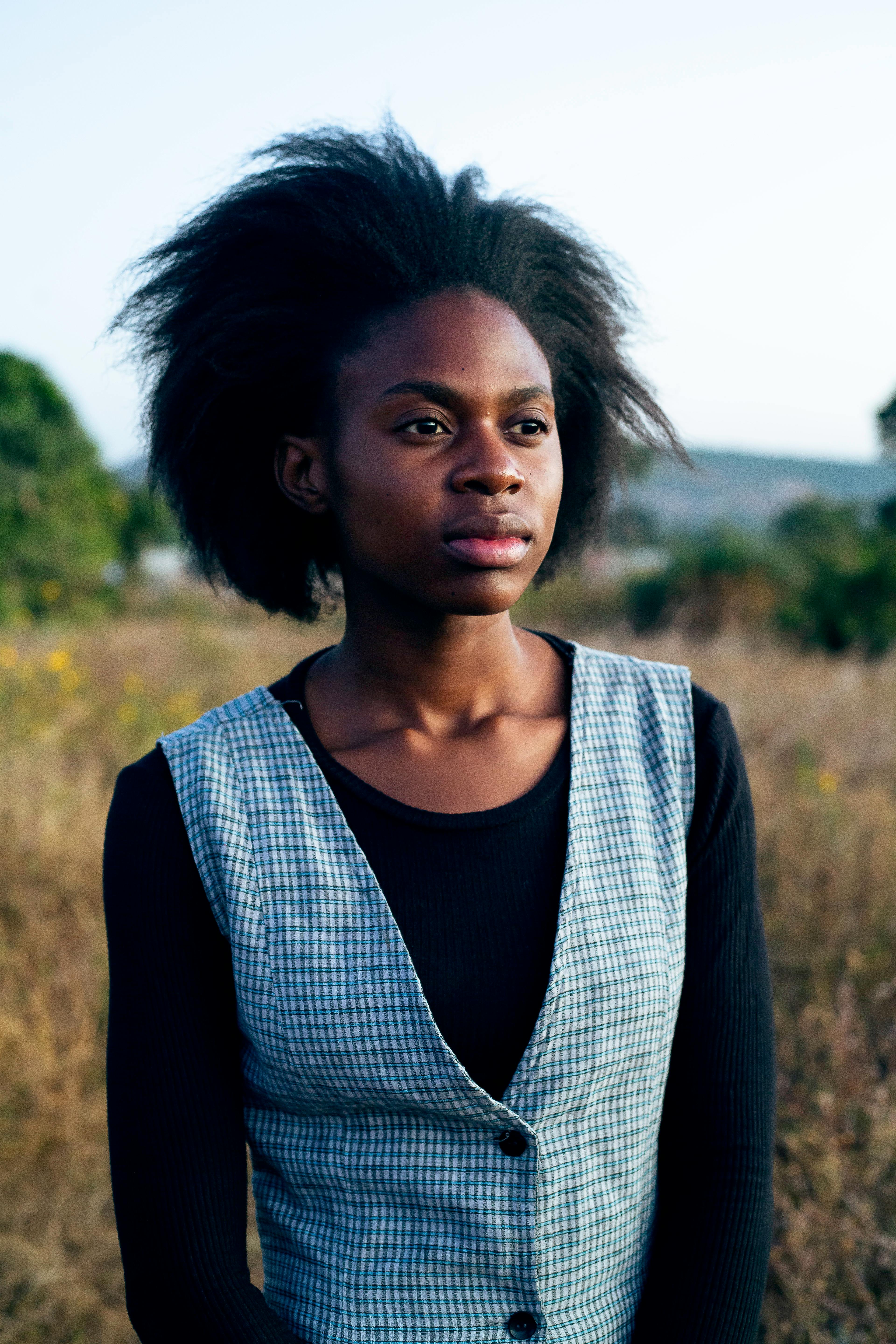 A Woman with Brown Top Looking Afar · Free Stock Photo