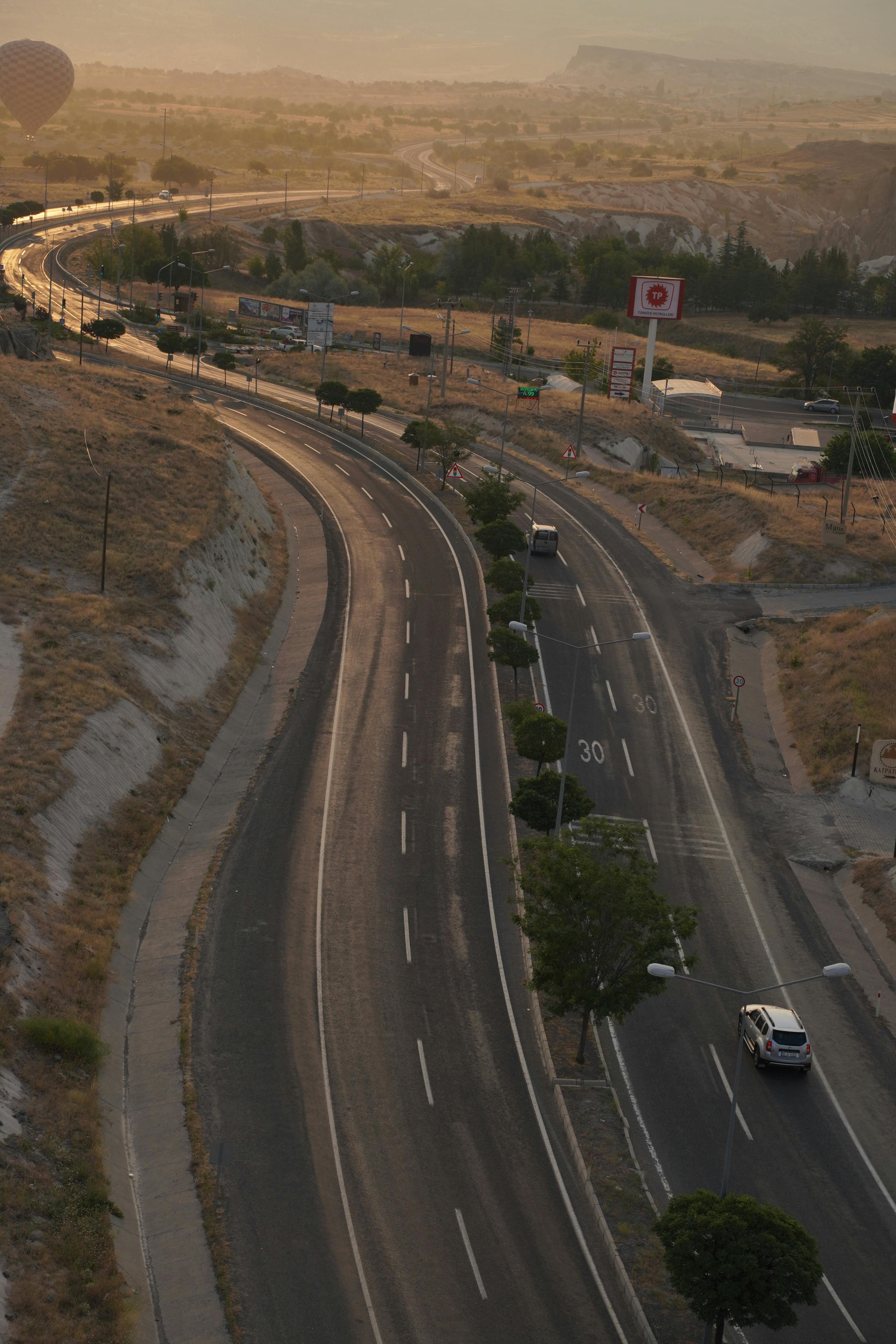 Top View of a Car Driving Down the Road between the Trees · Free Stock ...