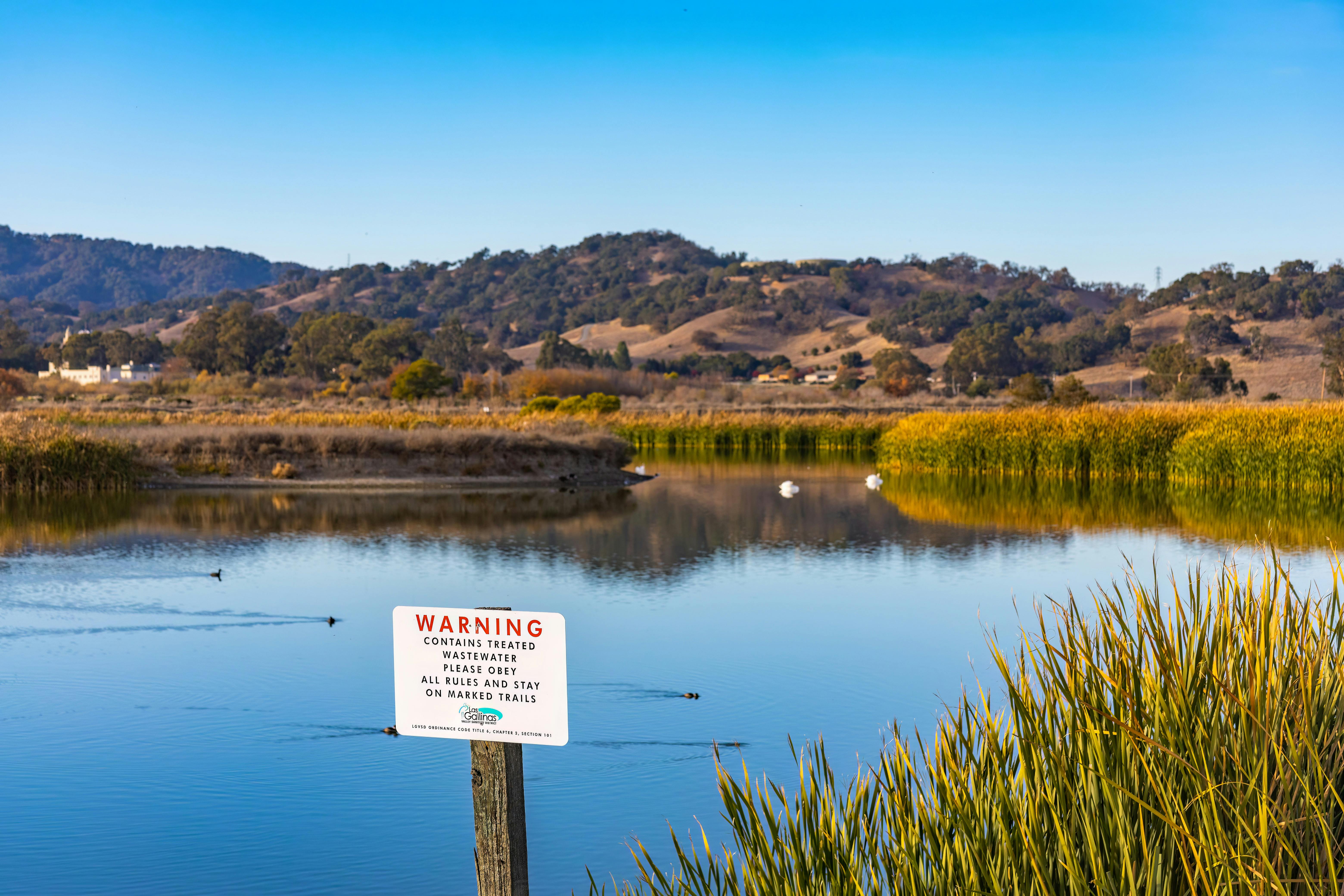 Reservoir with Warning · Free Stock Photo