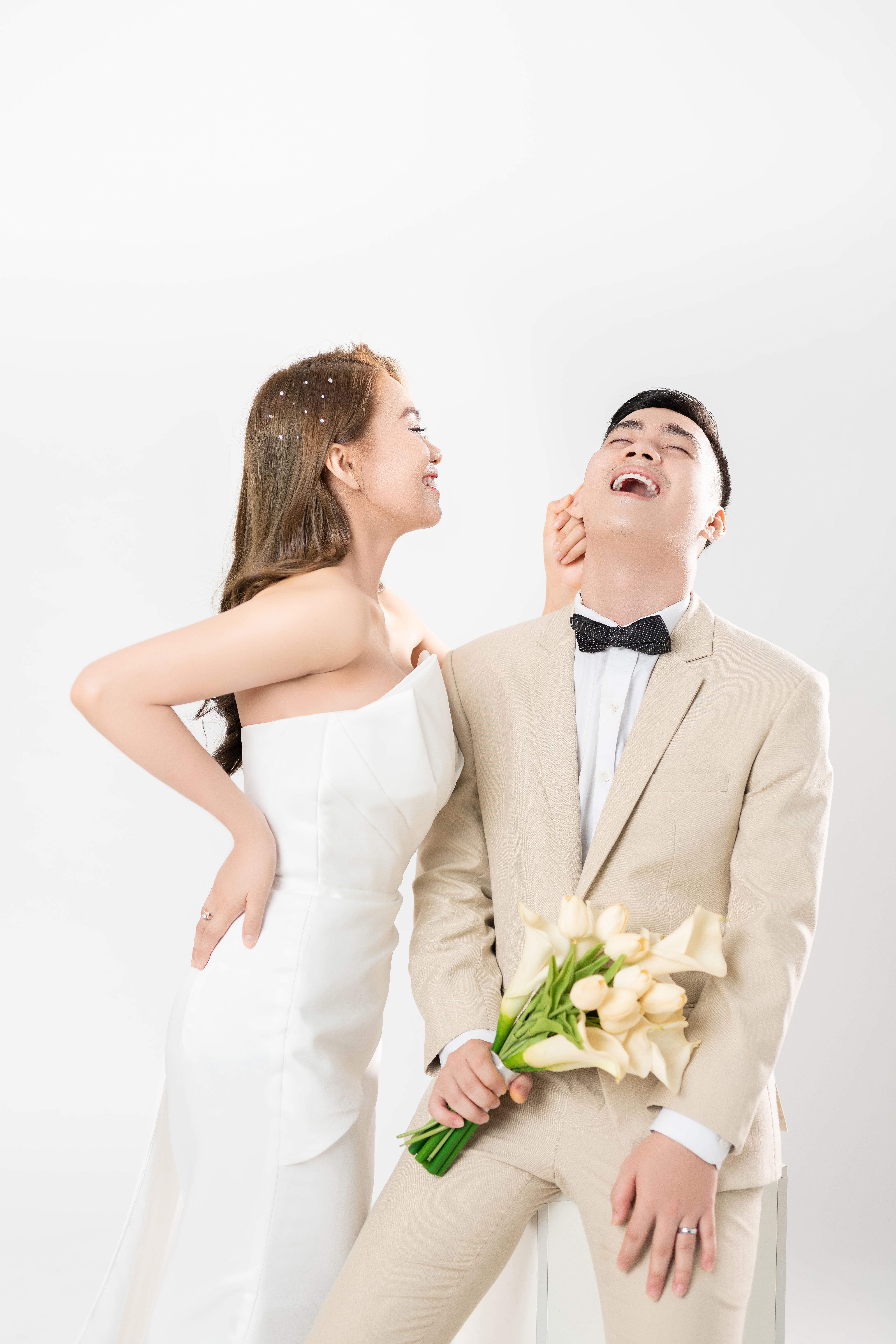 Bride and Groom Laughing Together · Free Stock Photo