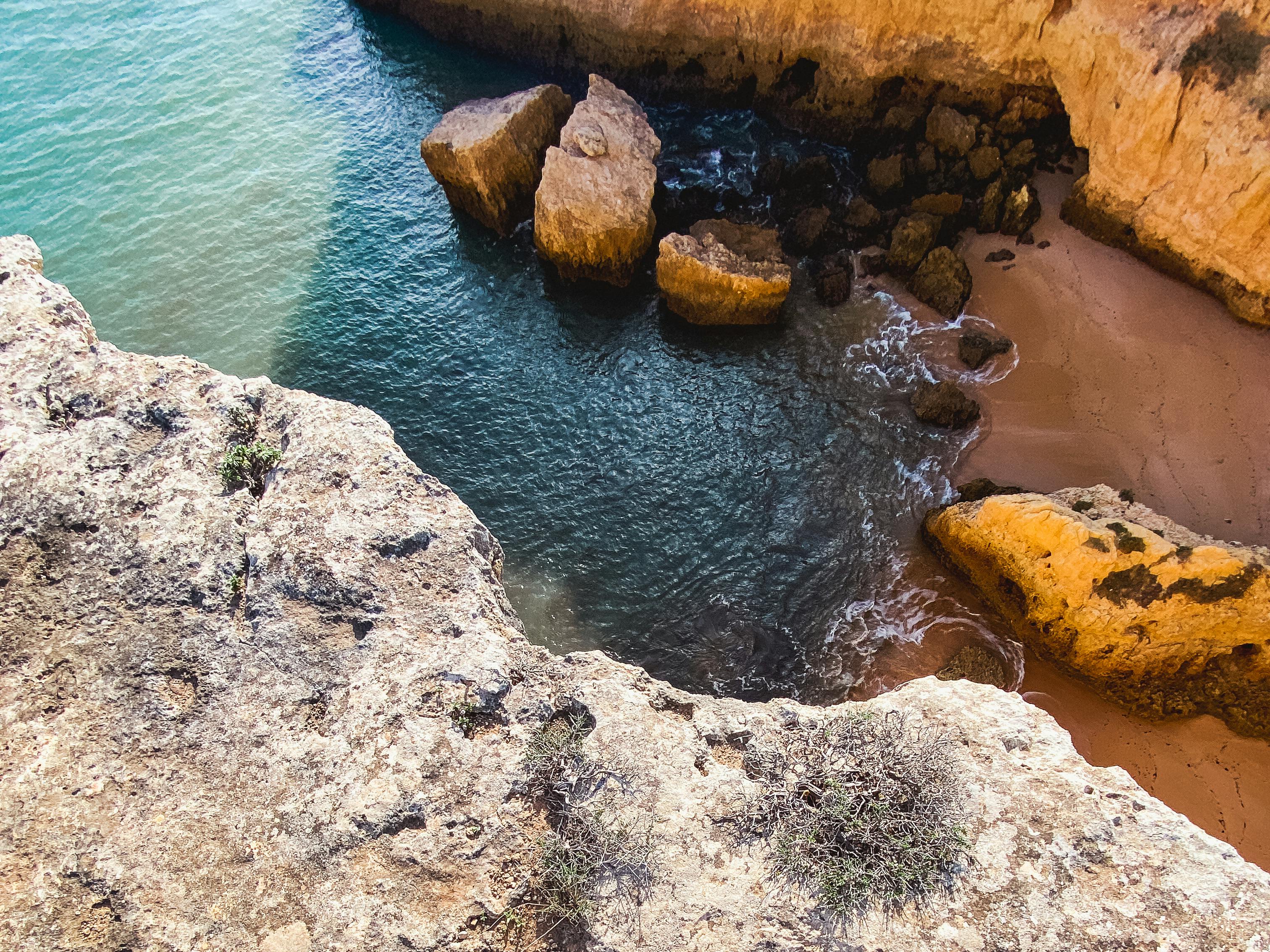 Photo of a Seashore with Rocks · Free Stock Photo