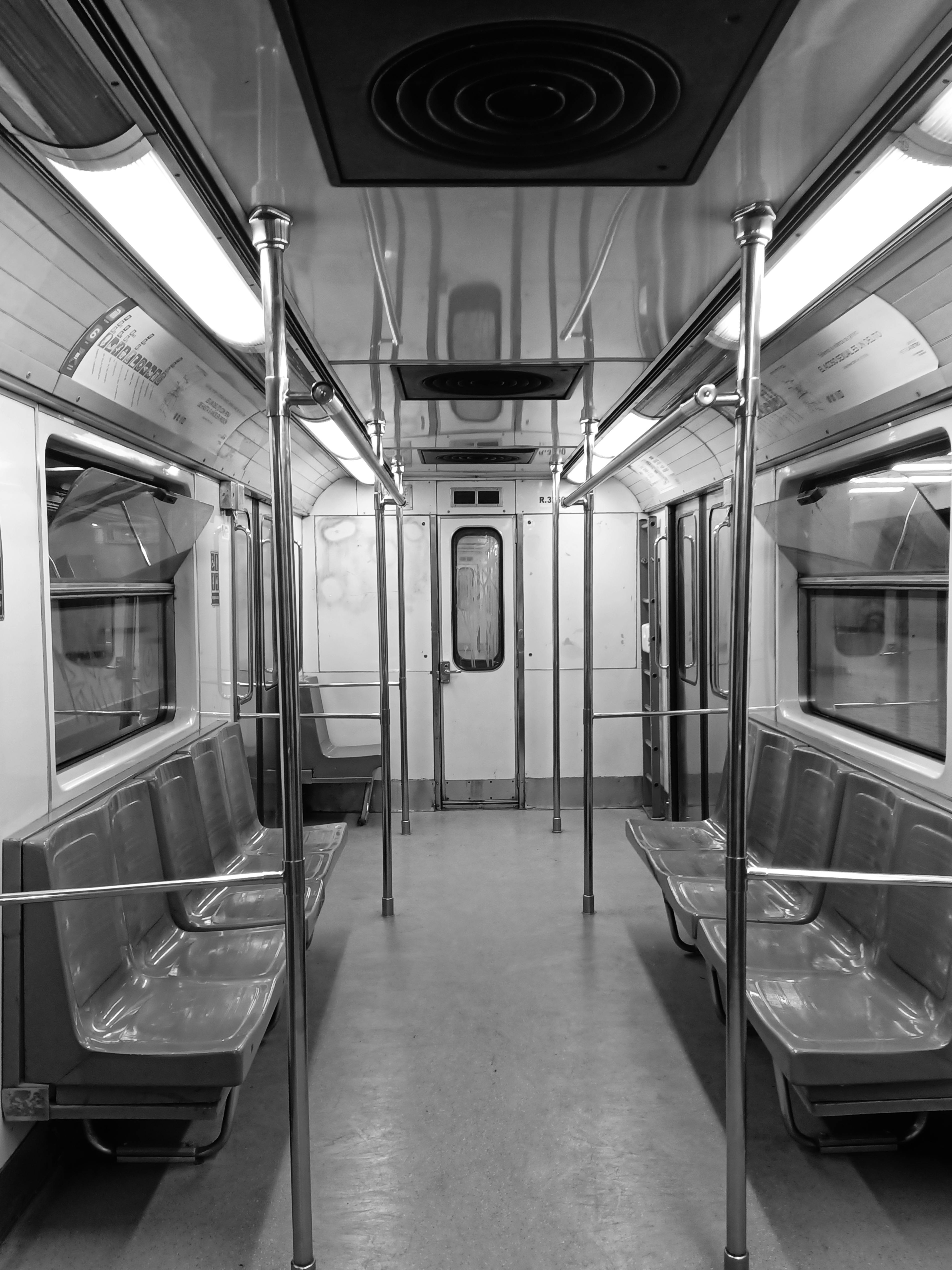 Grayscale Photography of Train Car Interior · Free Stock Photo
