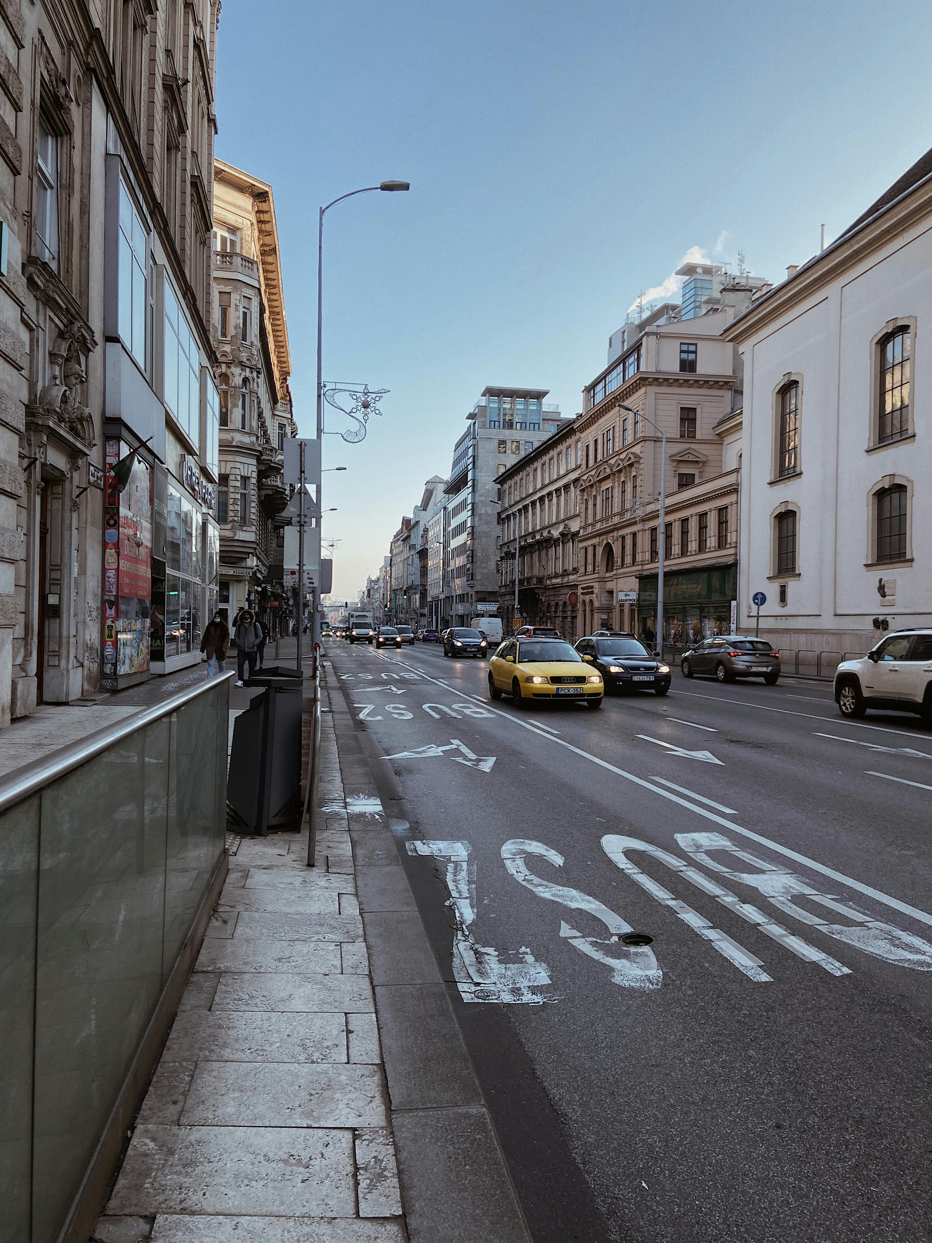 Road Between Buildings · Free Stock Photo