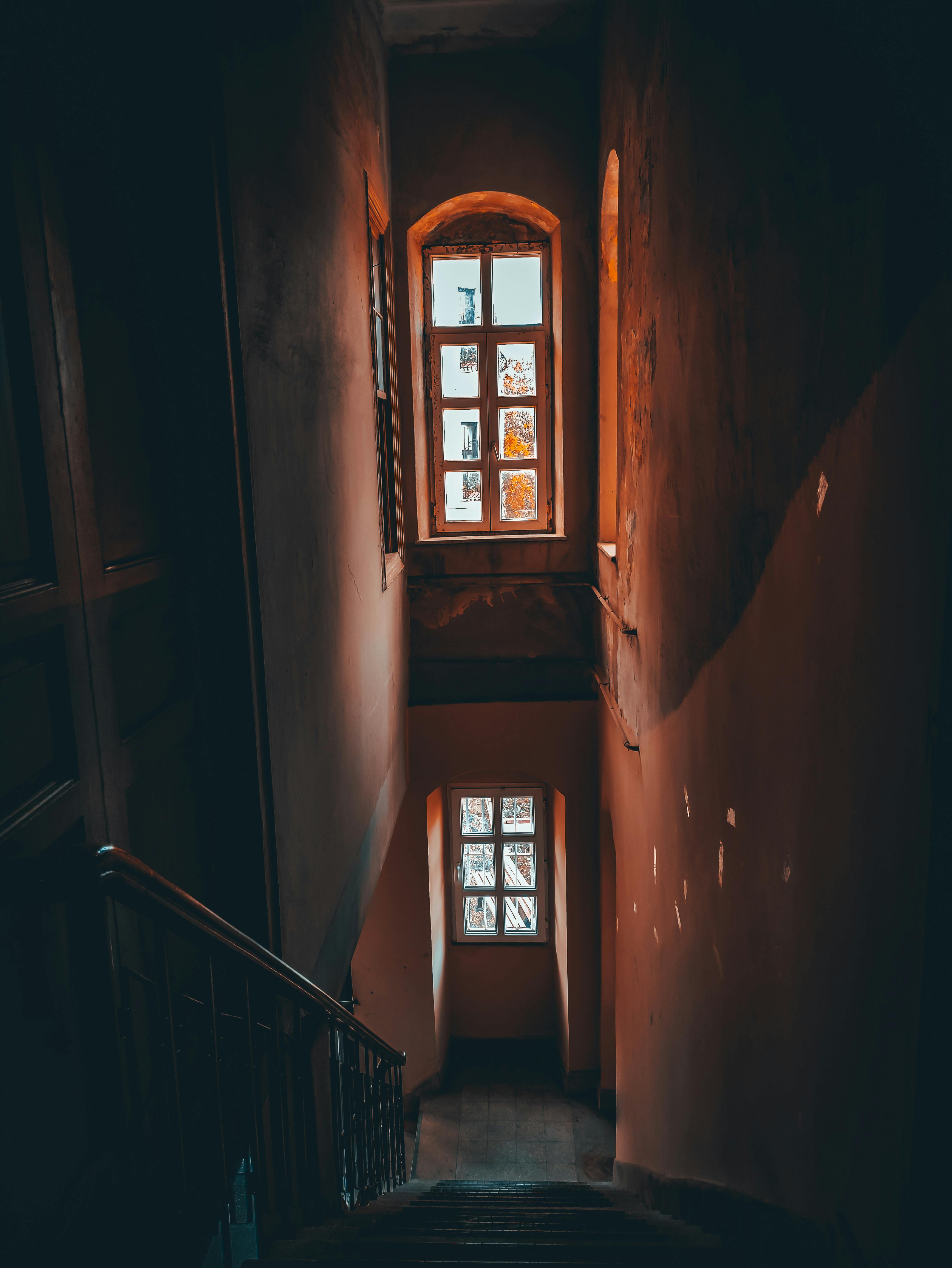 Photo of an Open Door and a Window inside a Dark Building · Free Stock ...