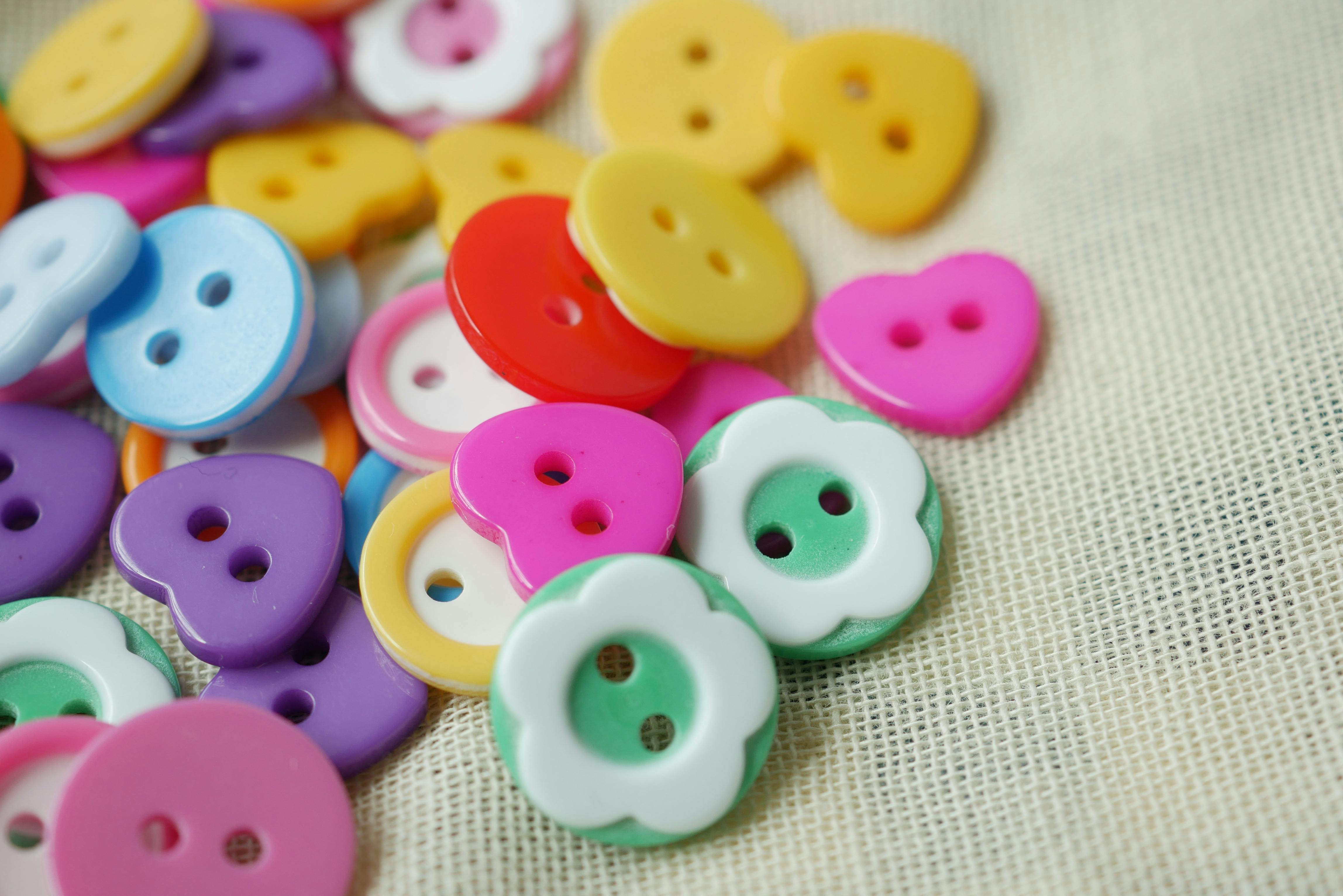 Colorful Plastic Sewing Buttons · Free Stock Photo