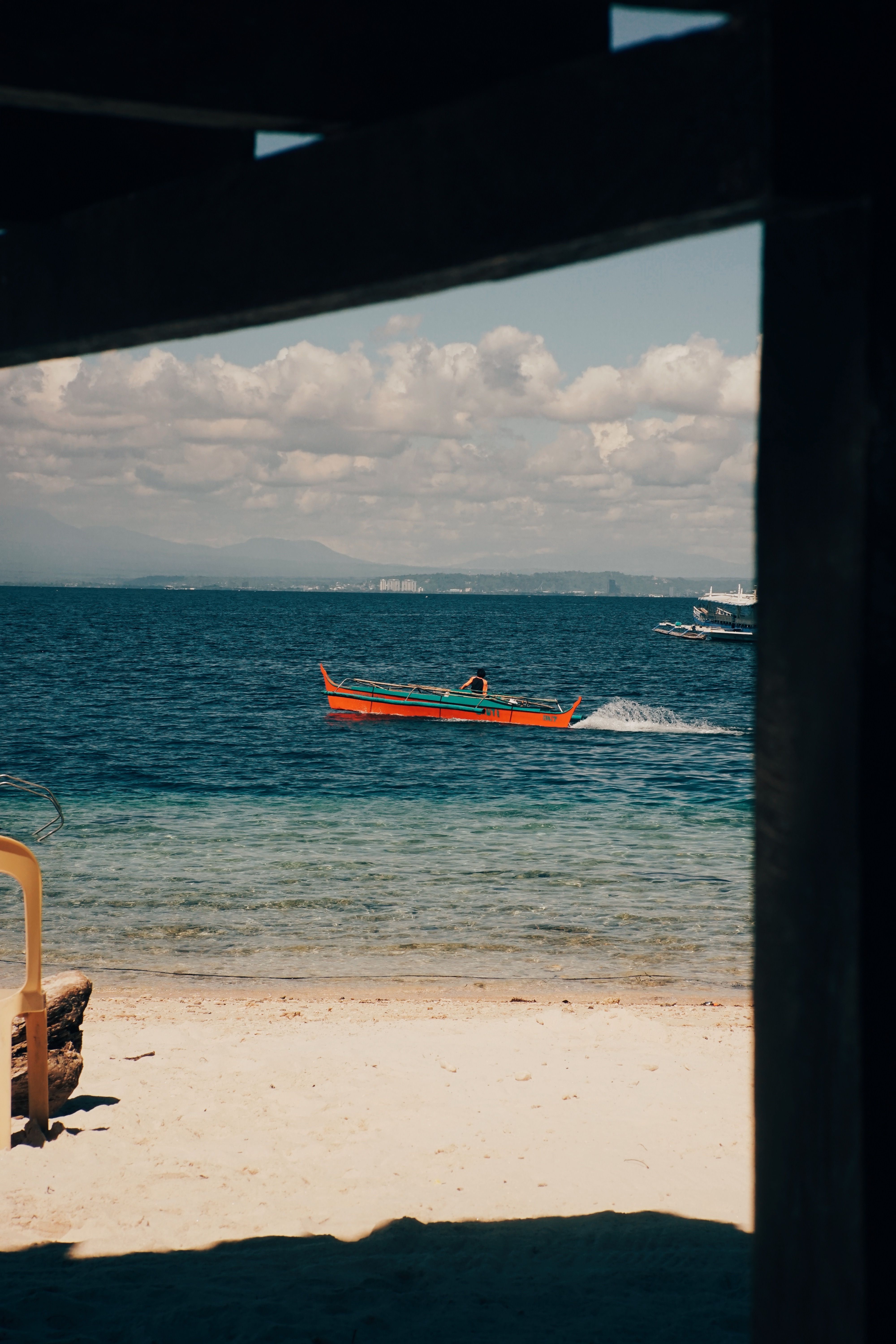 Person Riding on a Sailboat Sailing on Sea · Free Stock Photo