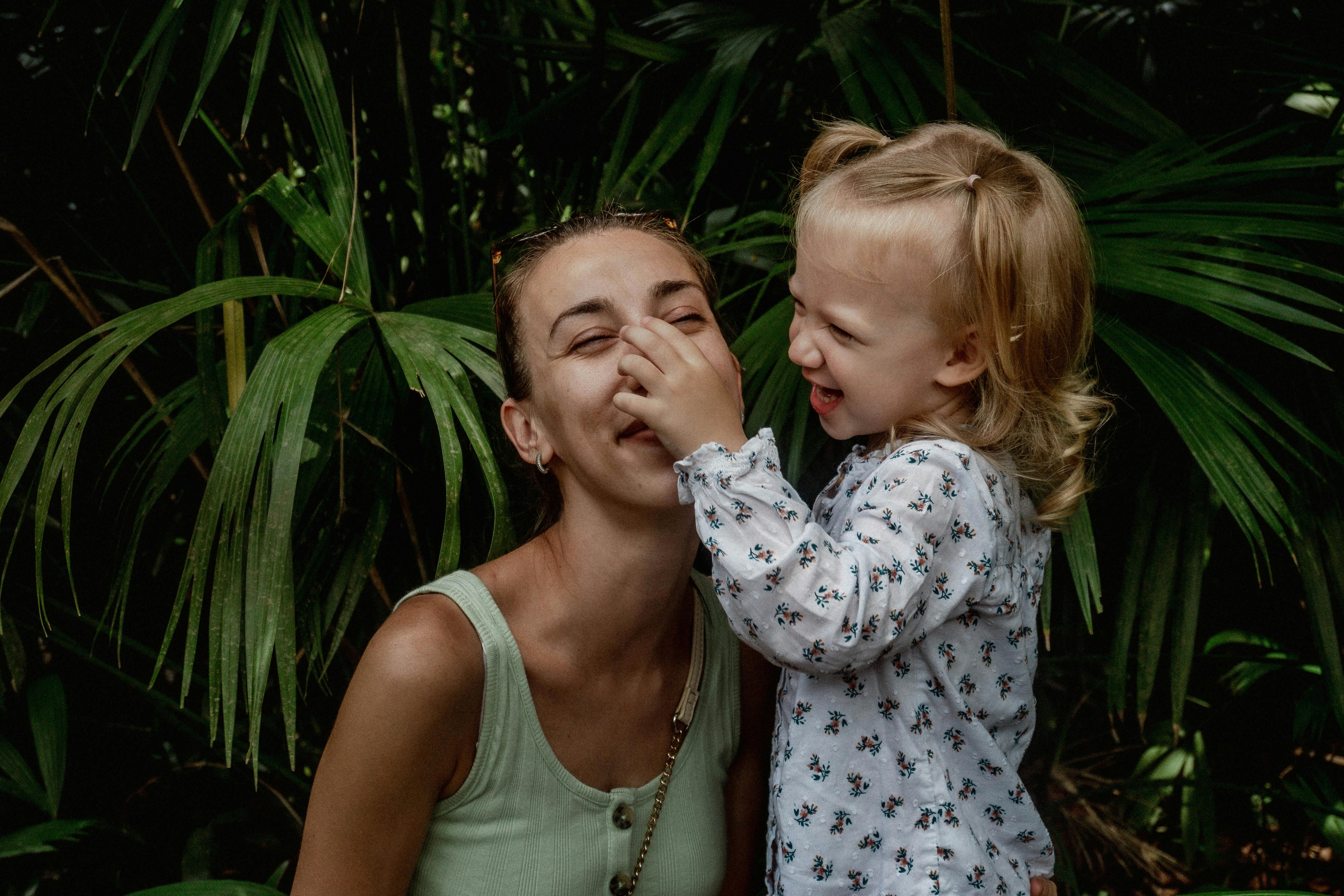 Child Touching Woman's Nose · Free Stock Photo