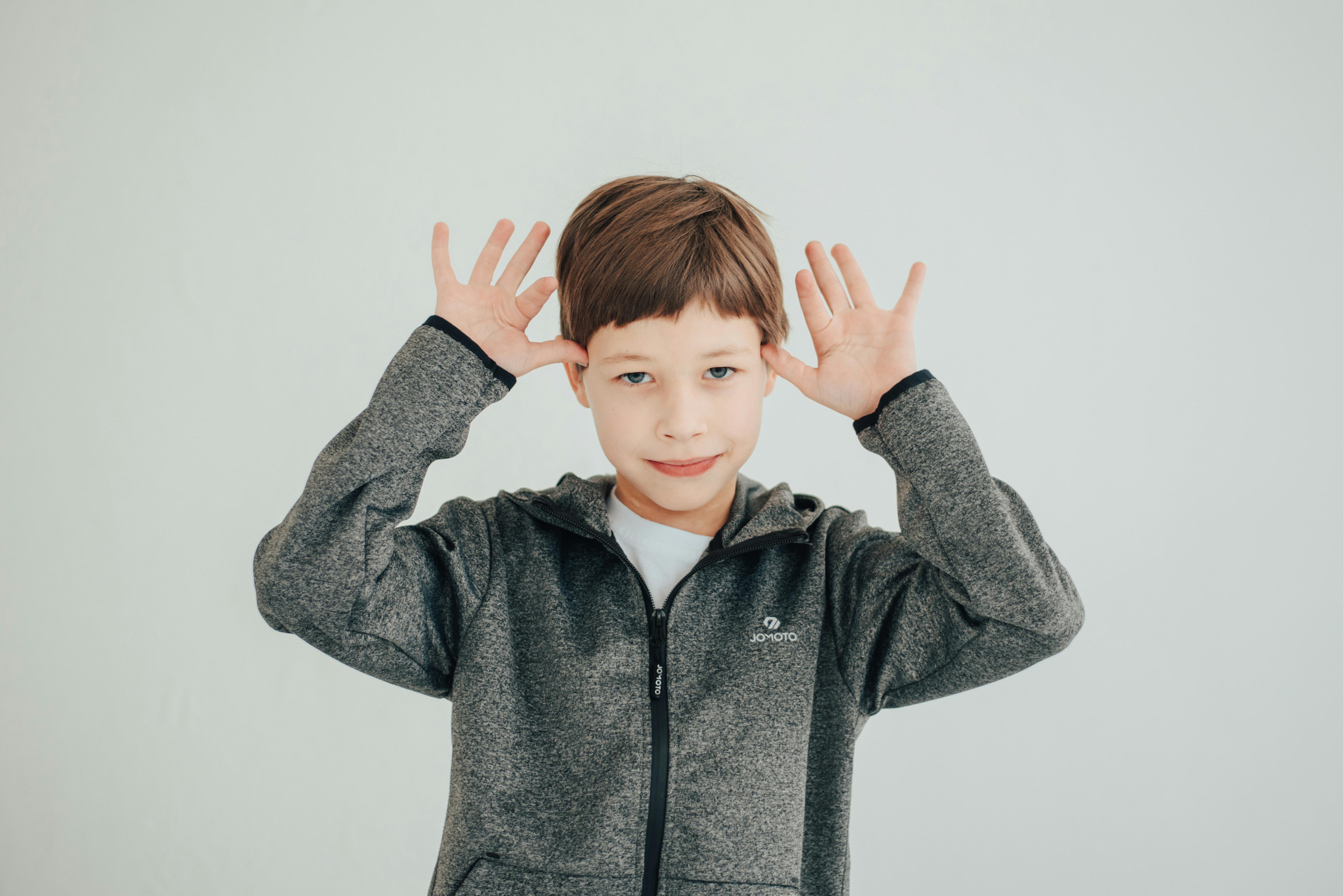 Boy Wearing Gray Zip Up Jacket · Free Stock Photo