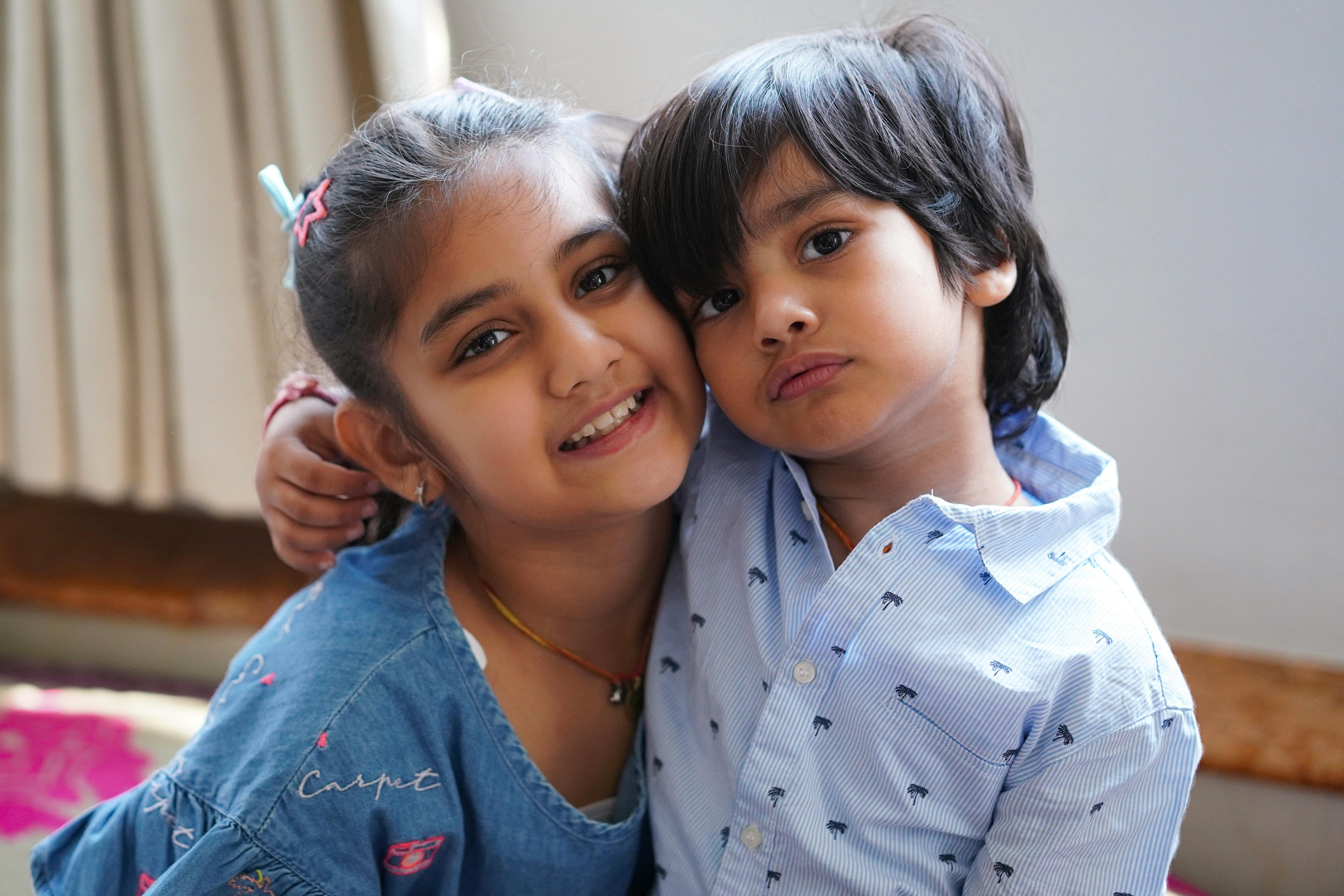 Girl and Boy Posing Together · Free Stock Photo