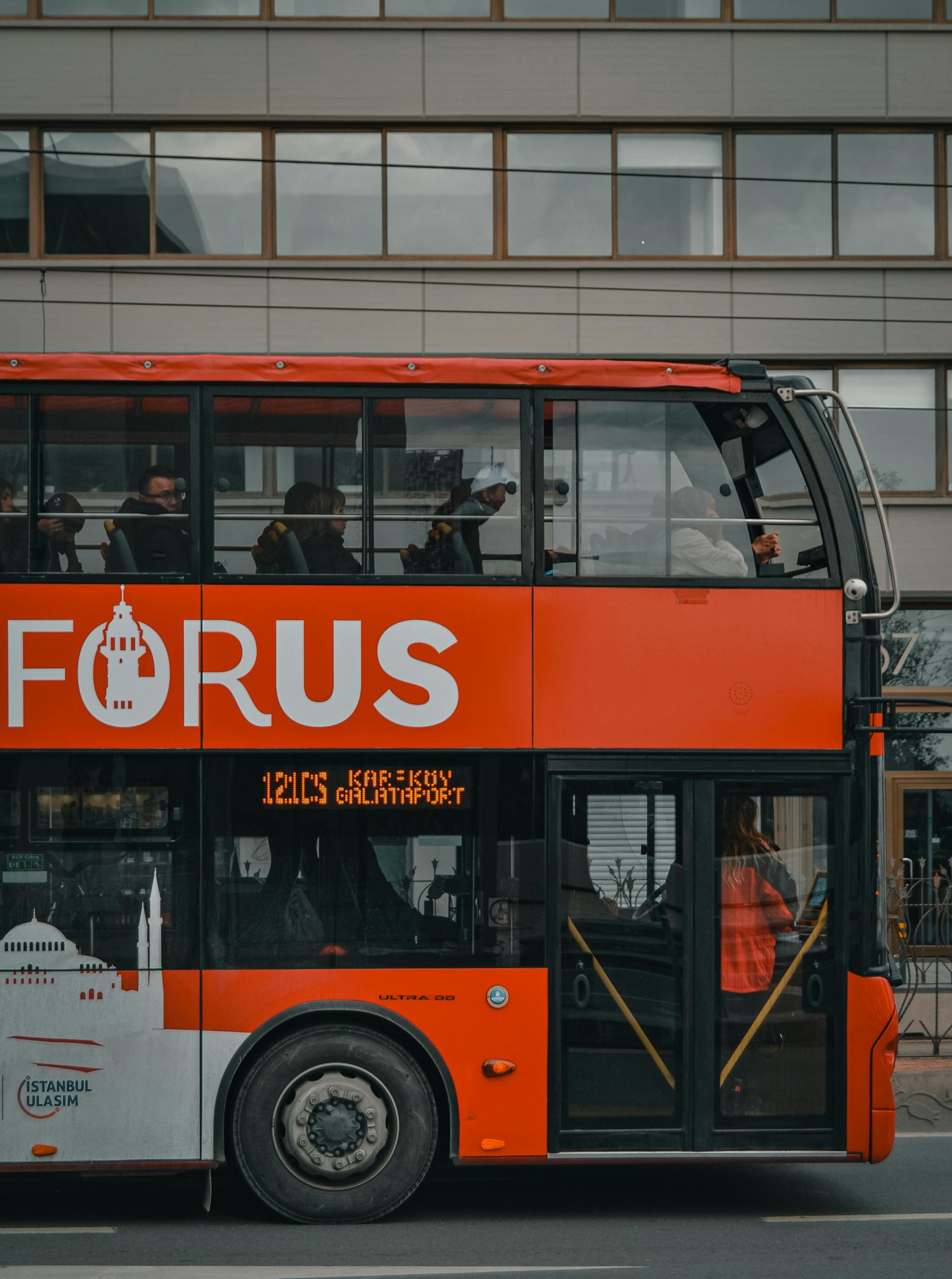 Orange Bus Parked on the Street · Free Stock Photo
