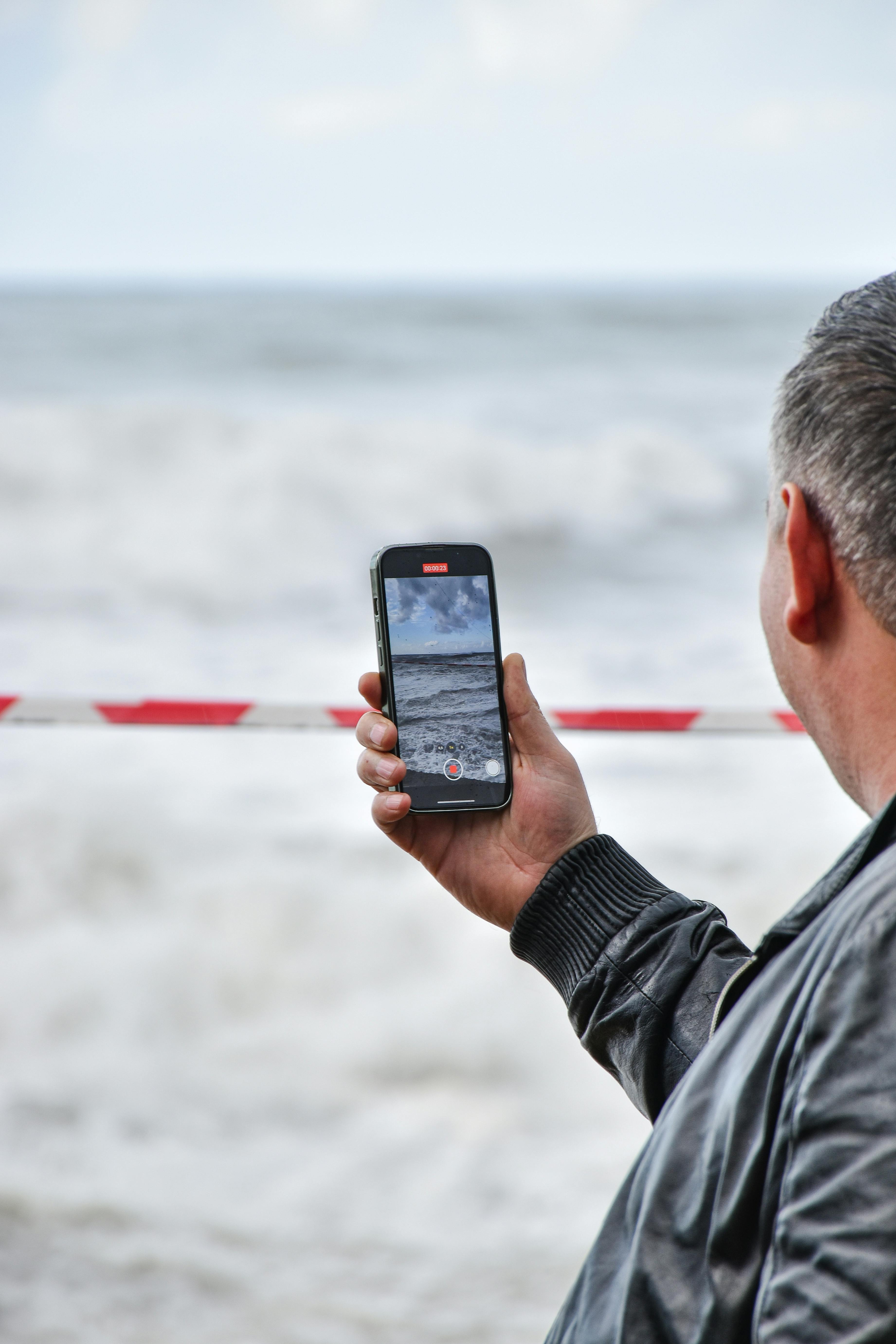 Hands Recording Video with Smartphone · Free Stock Photo