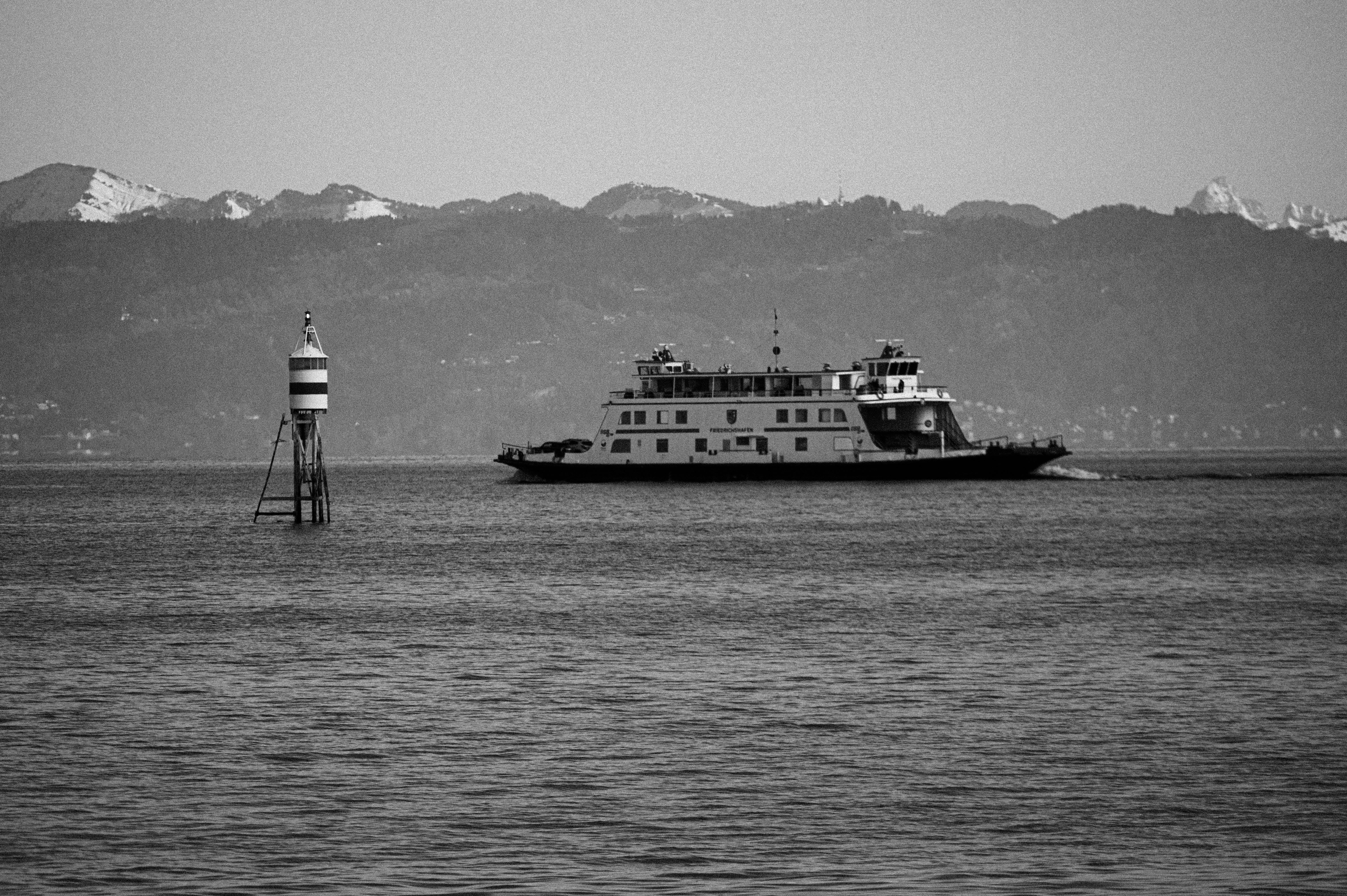 Grayscale Photography of Ferry Ship Sailing on the Sea · Free Stock Photo