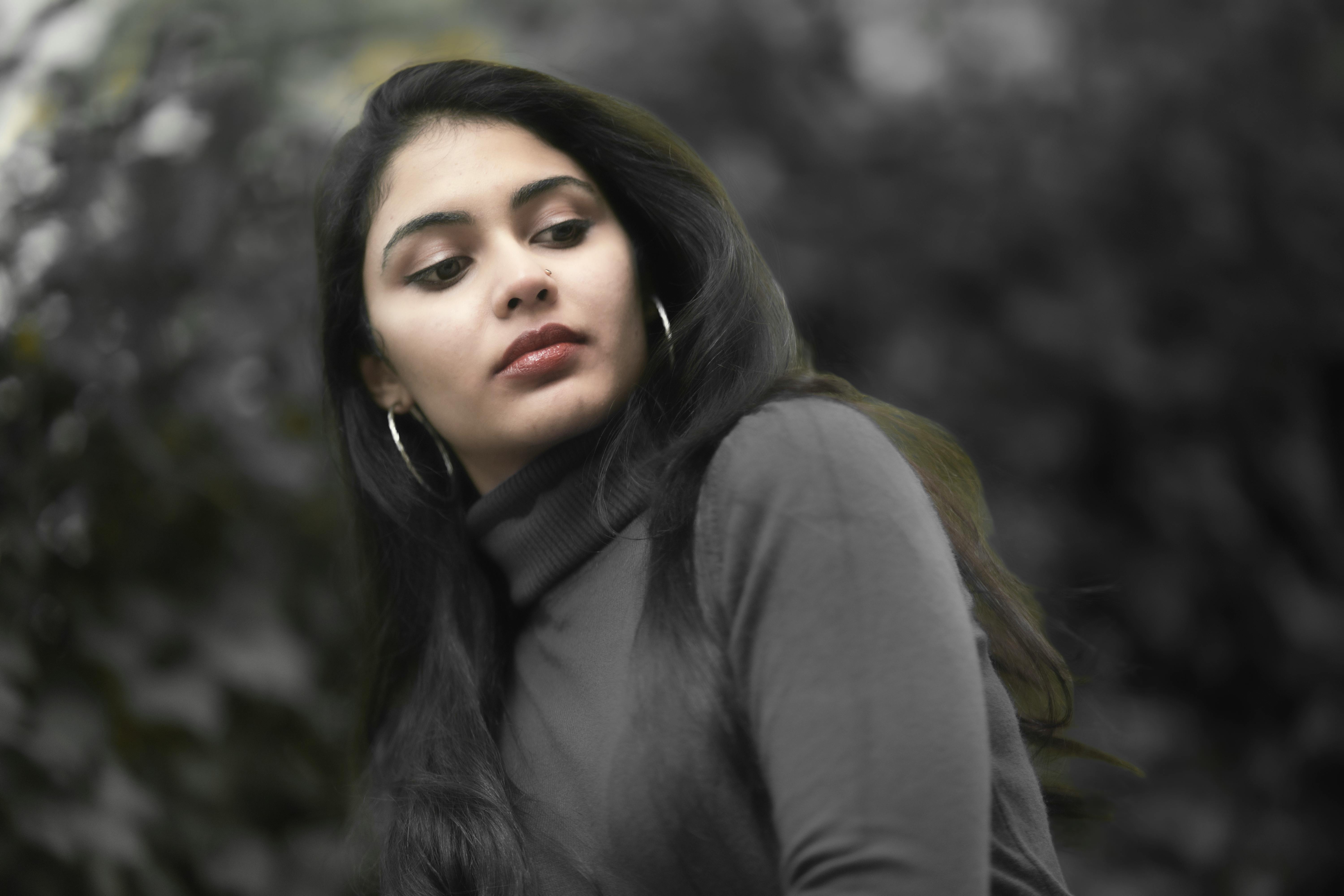 Woman Smoking Alone Near the Couch · Free Stock Photo