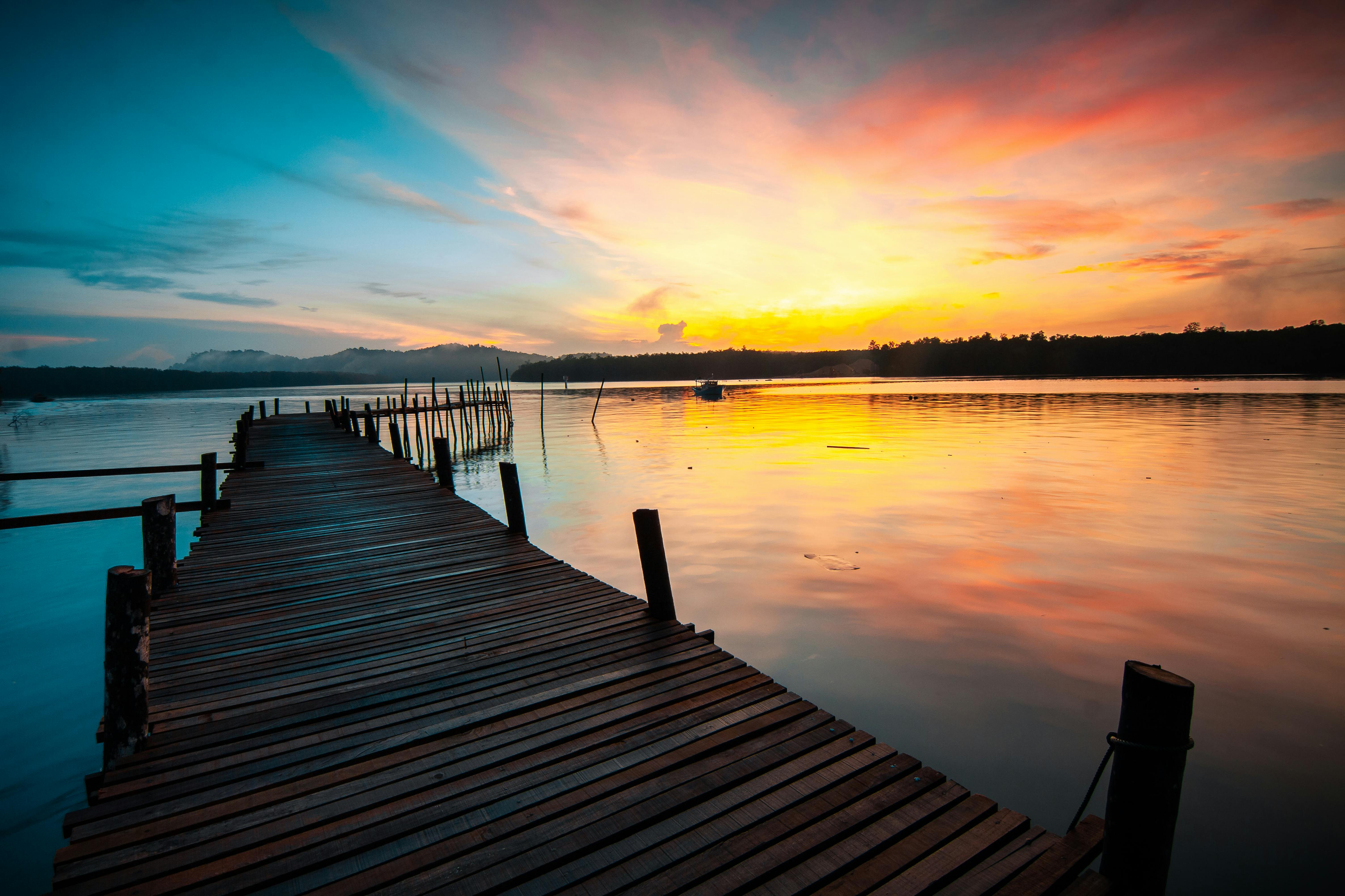 A Wooden Jetty during Golden Hour · Free Stock Photo