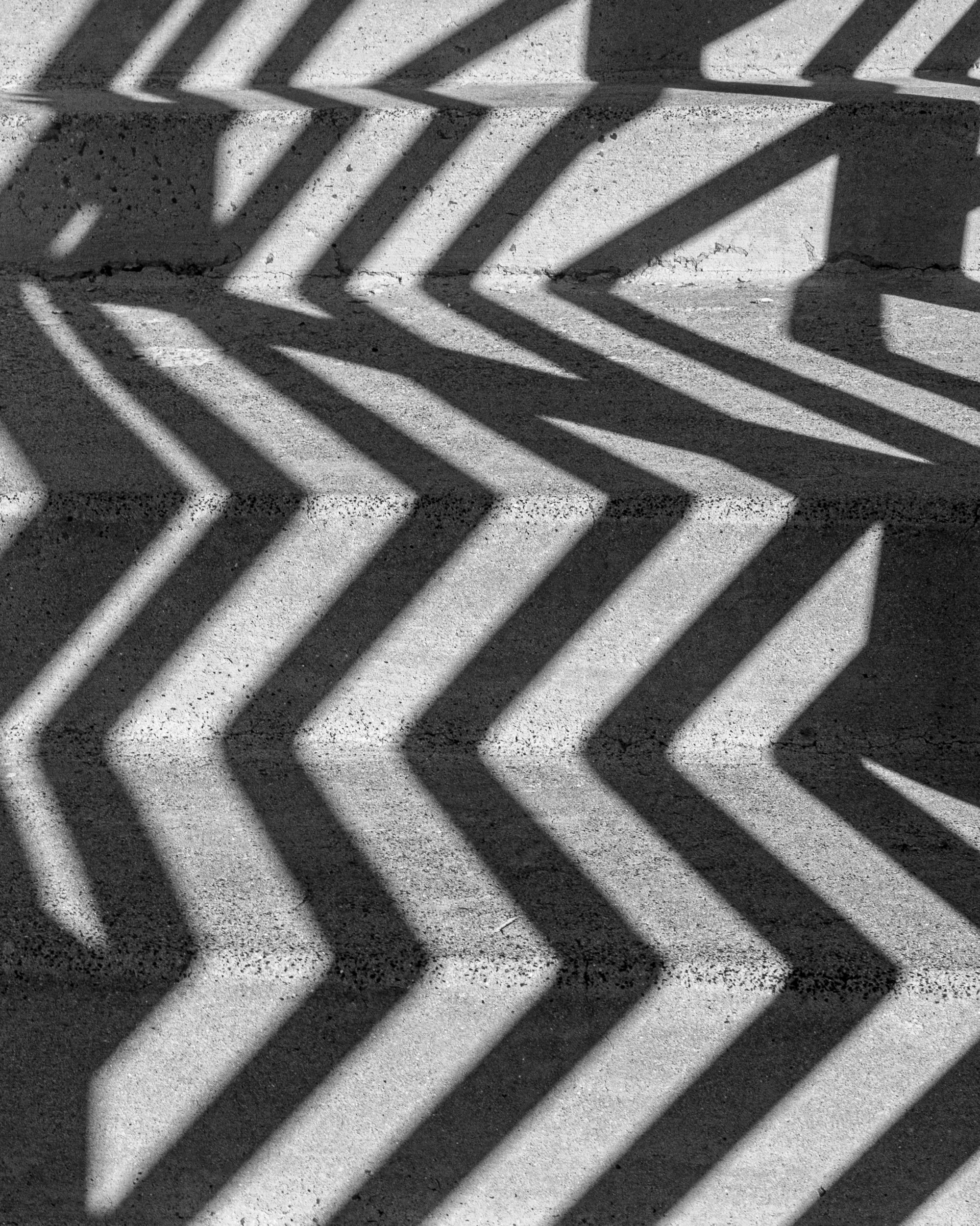 Crooked Shadow on Asphalt Ground · Free Stock Photo