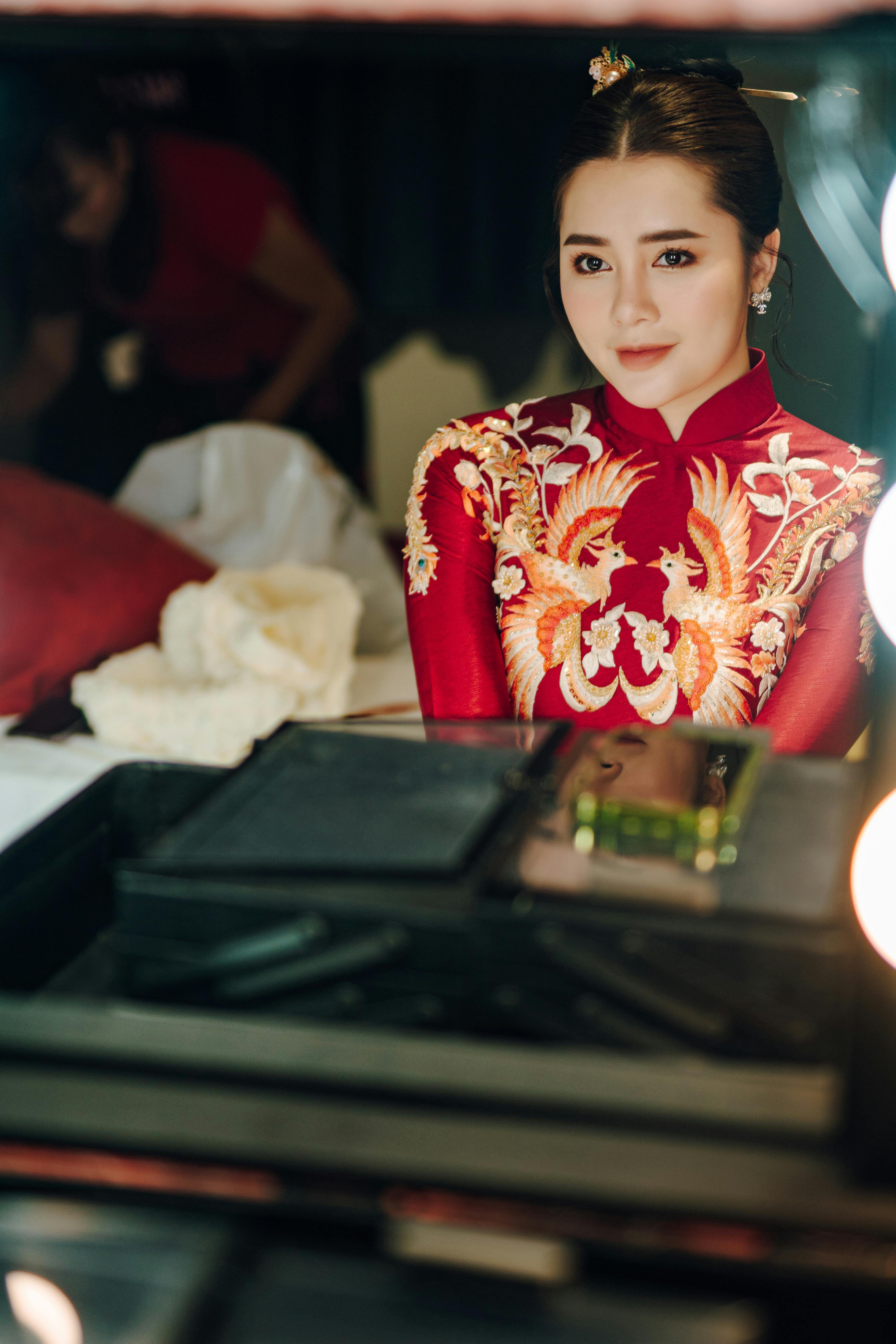 A Pretty Woman in a Red Traditional Clothing · Free Stock Photo