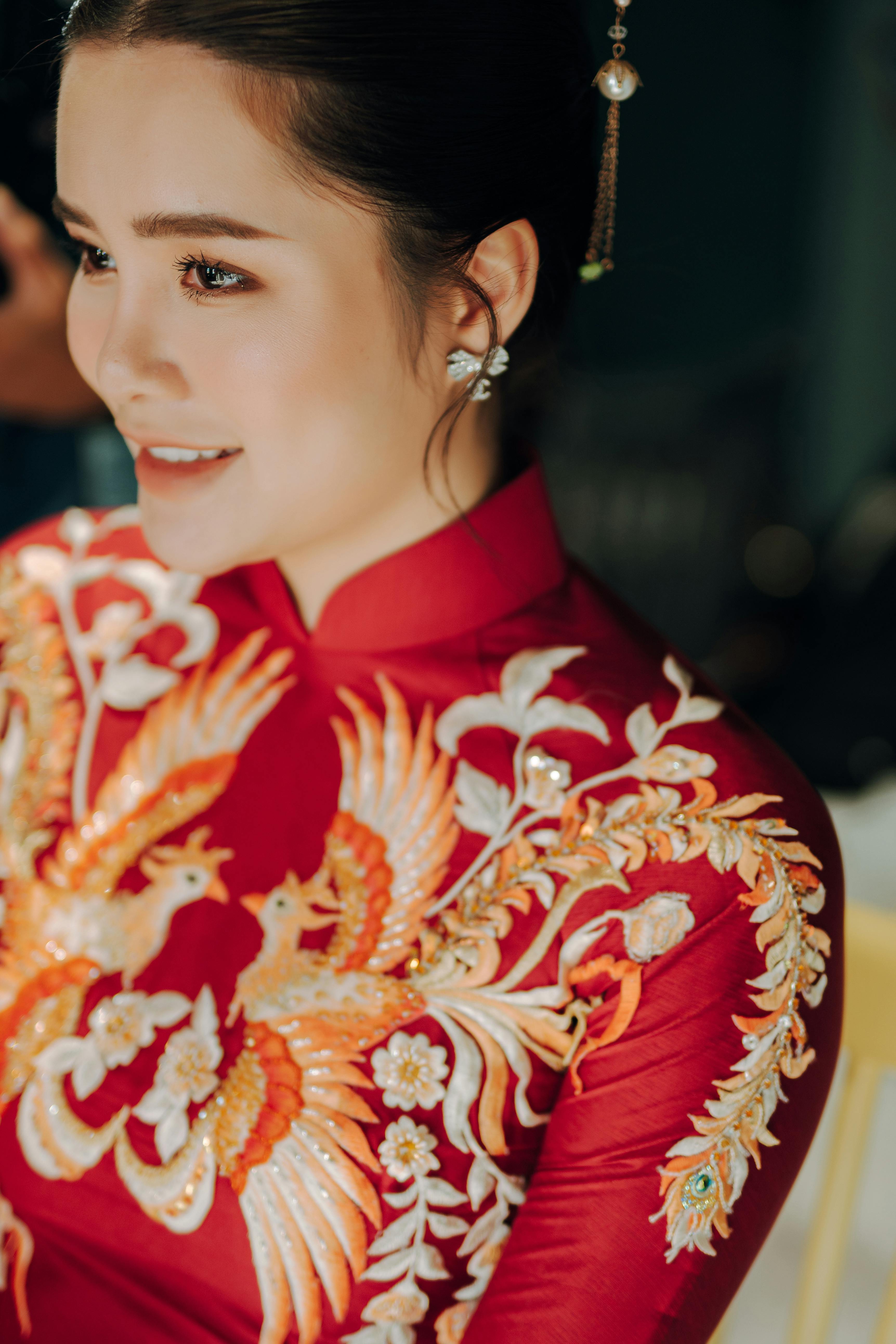 Portrait of a Woman in Red Traditional Clothes · Free Stock Photo