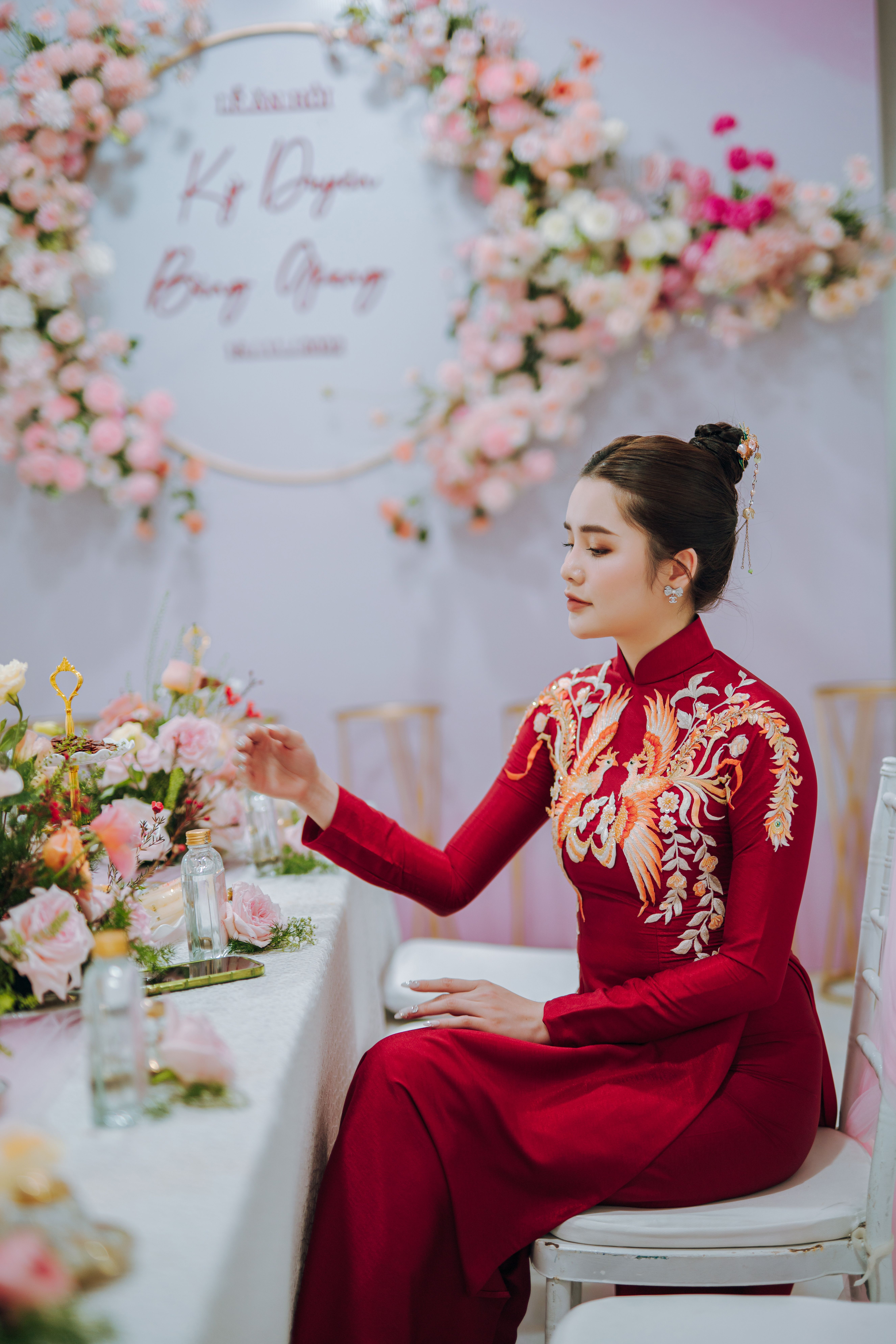 Woman Sitting in Red, Decorated Dress · Free Stock Photo