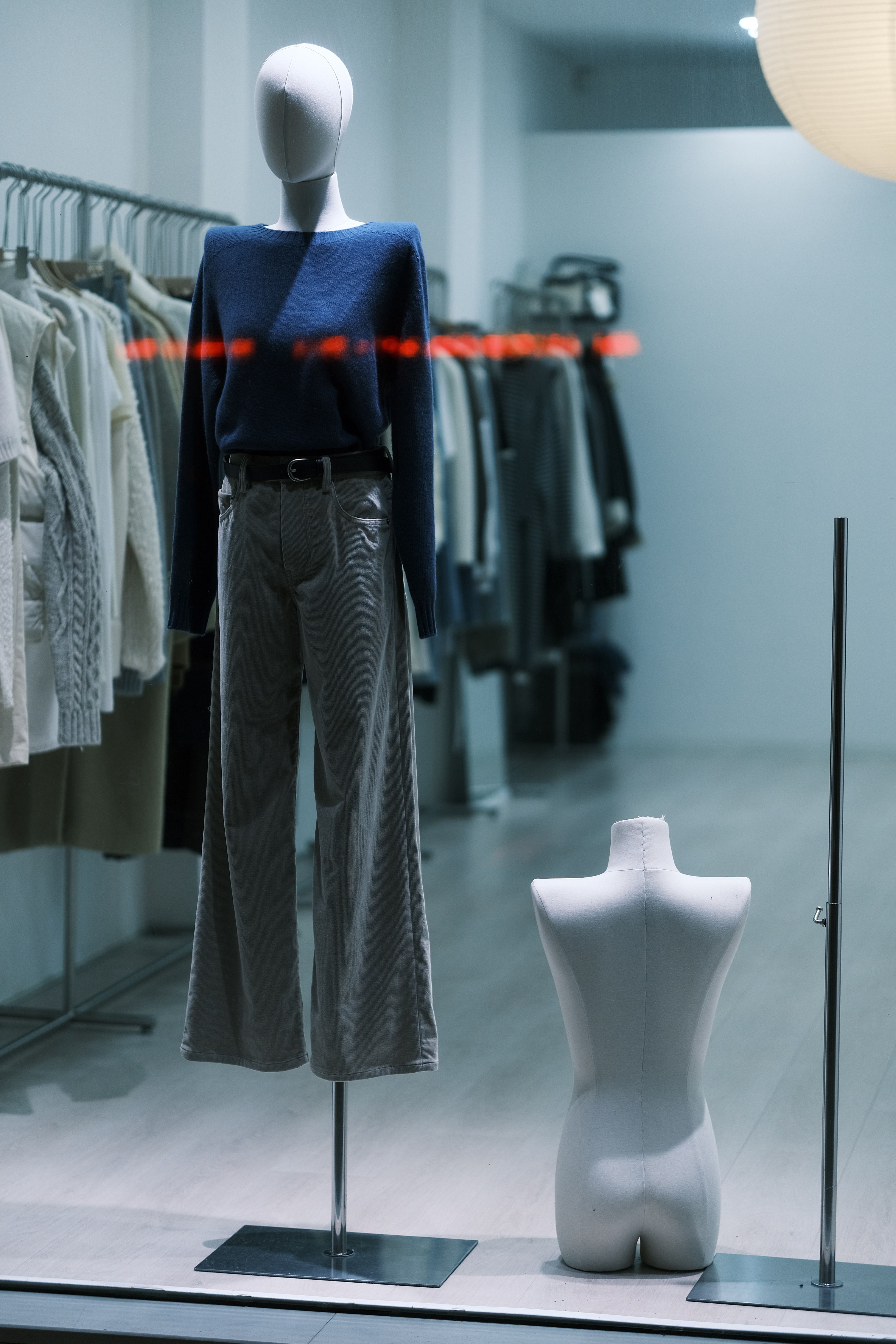 Mannequins behind Window · Free Stock Photo