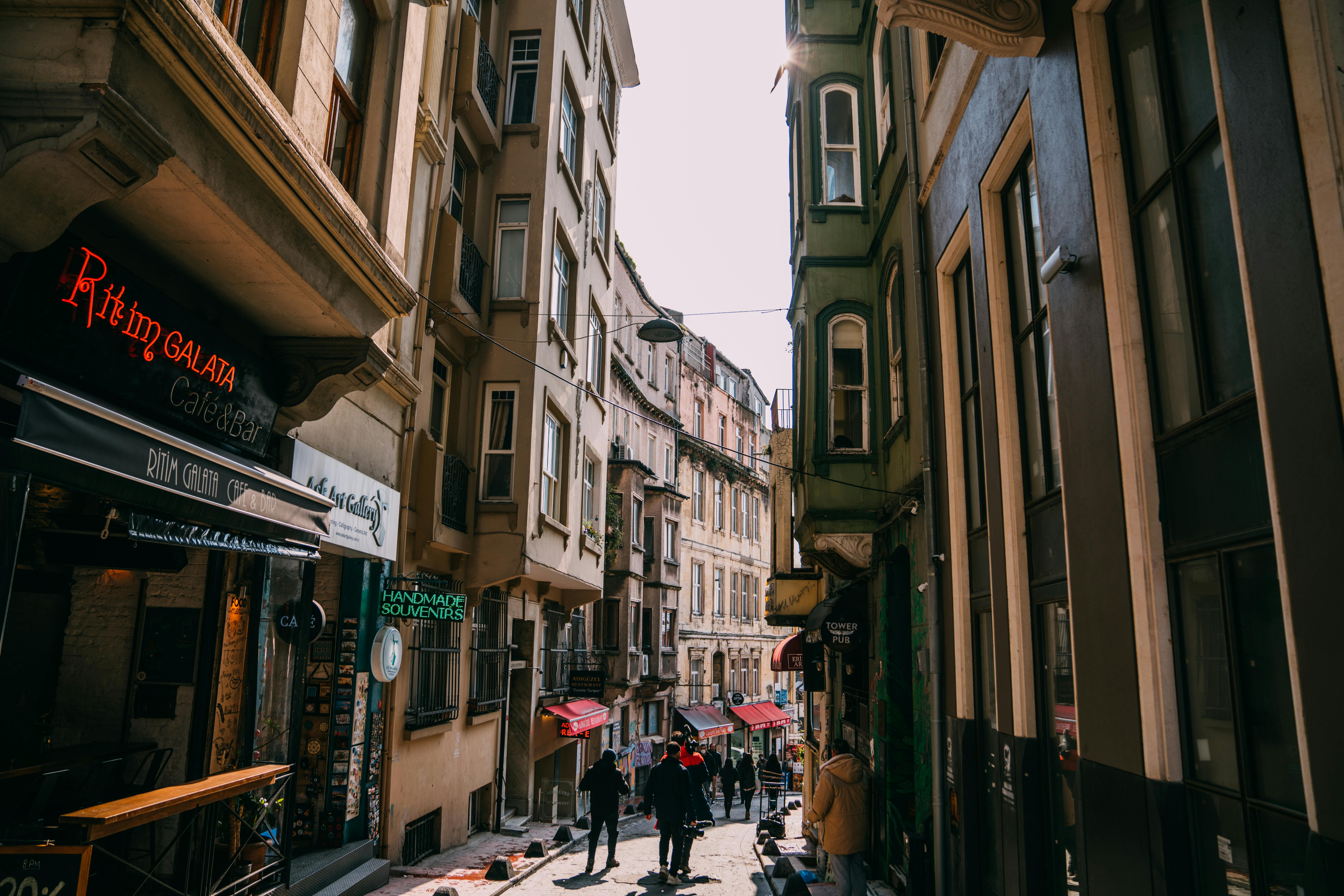 Narrow Street between Concrete Buildings · Free Stock Photo