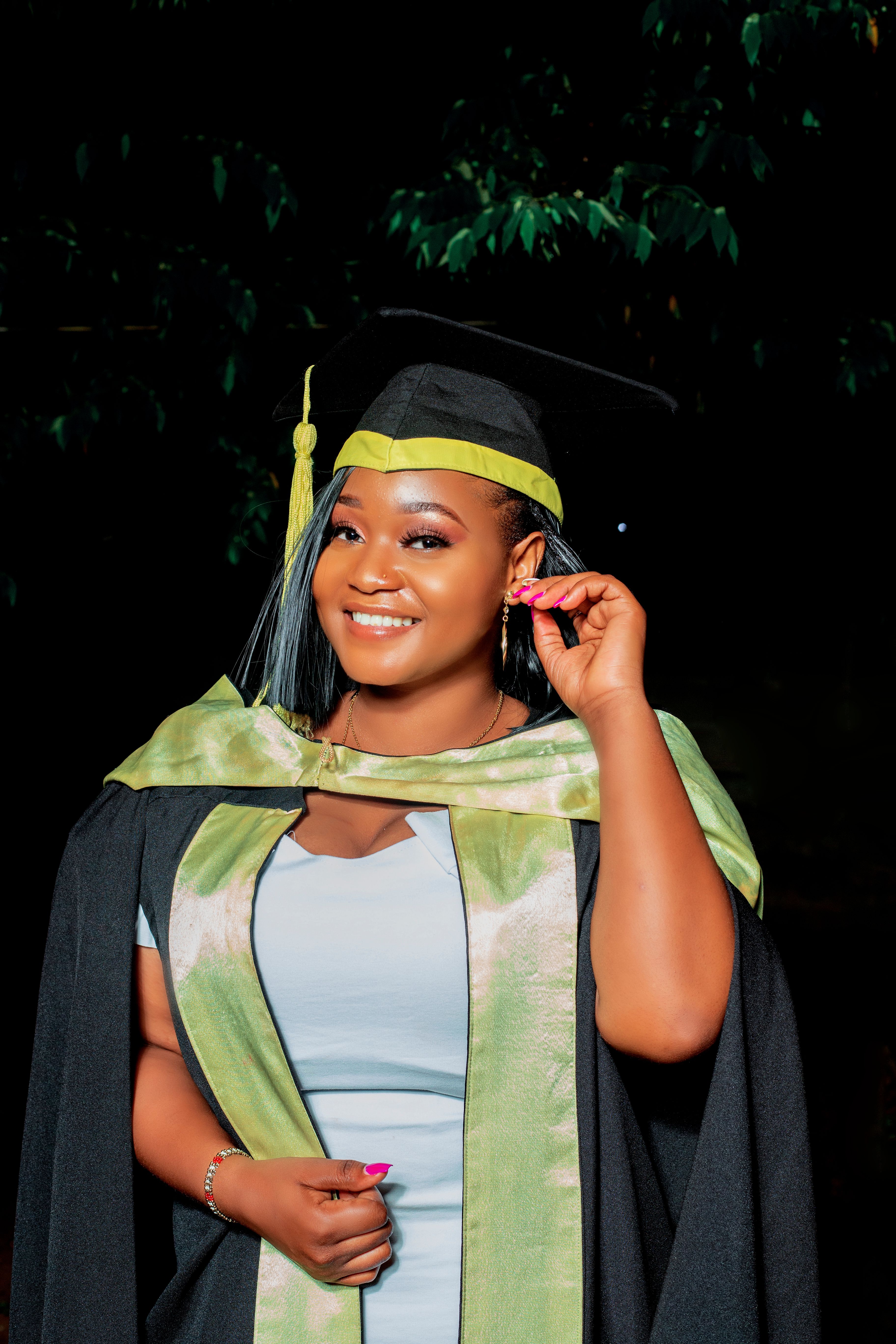 A Girl Wearing a Graduation Gown · Free Stock Photo