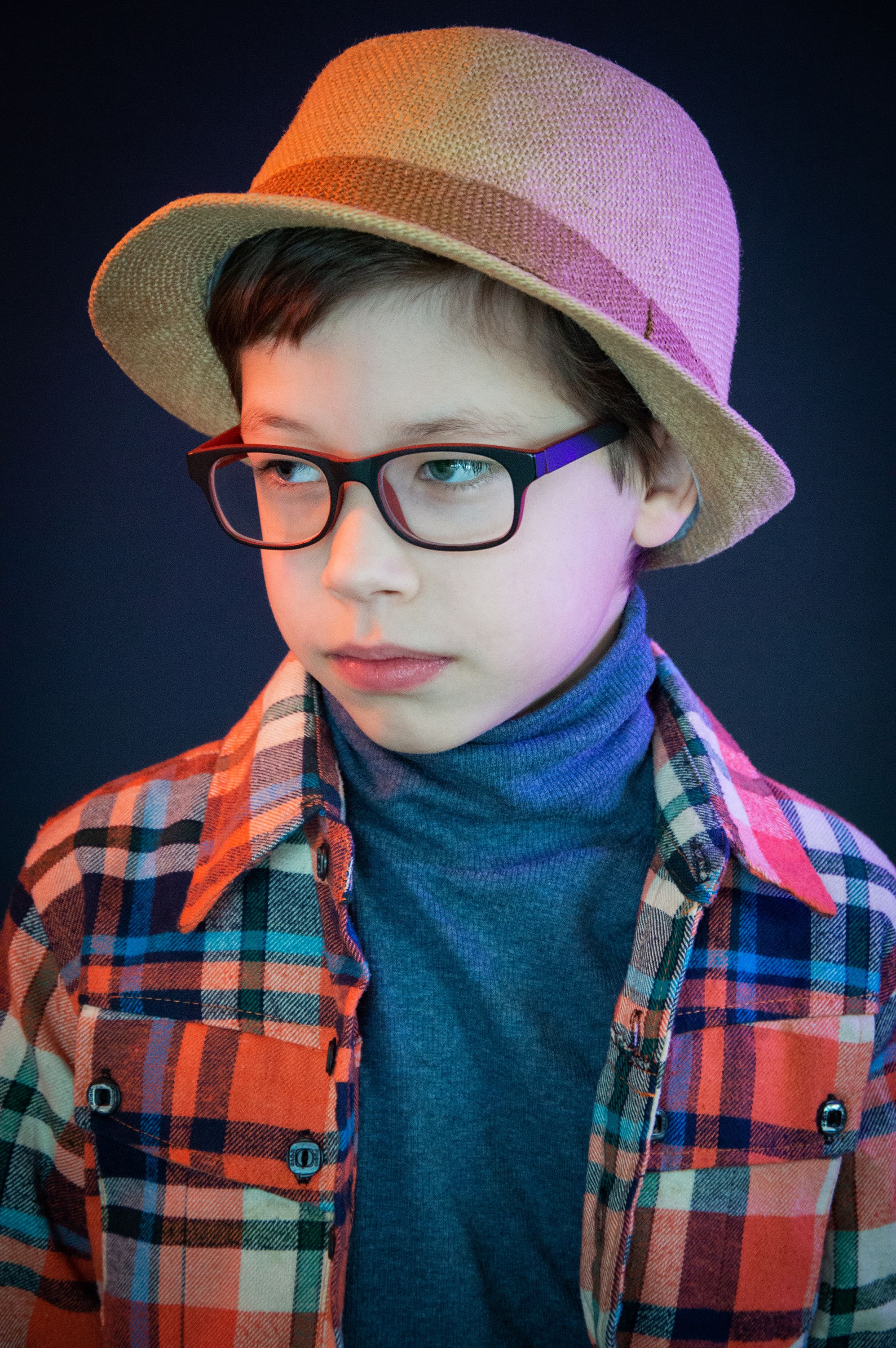 A Boy Wearing Eyeglasses and Fedora Hat · Free Stock Photo
