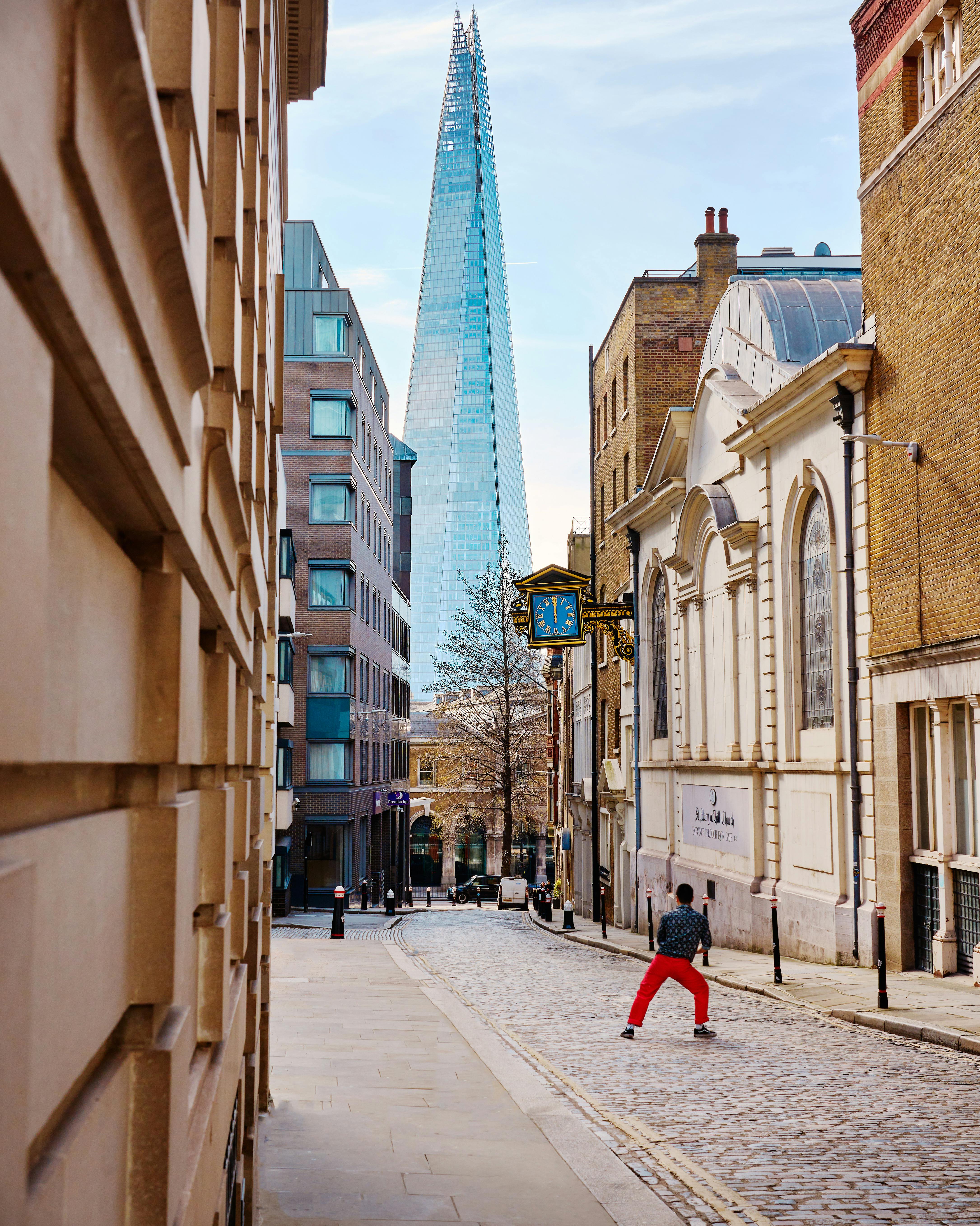 Man Standing on a City Street · Free Stock Photo