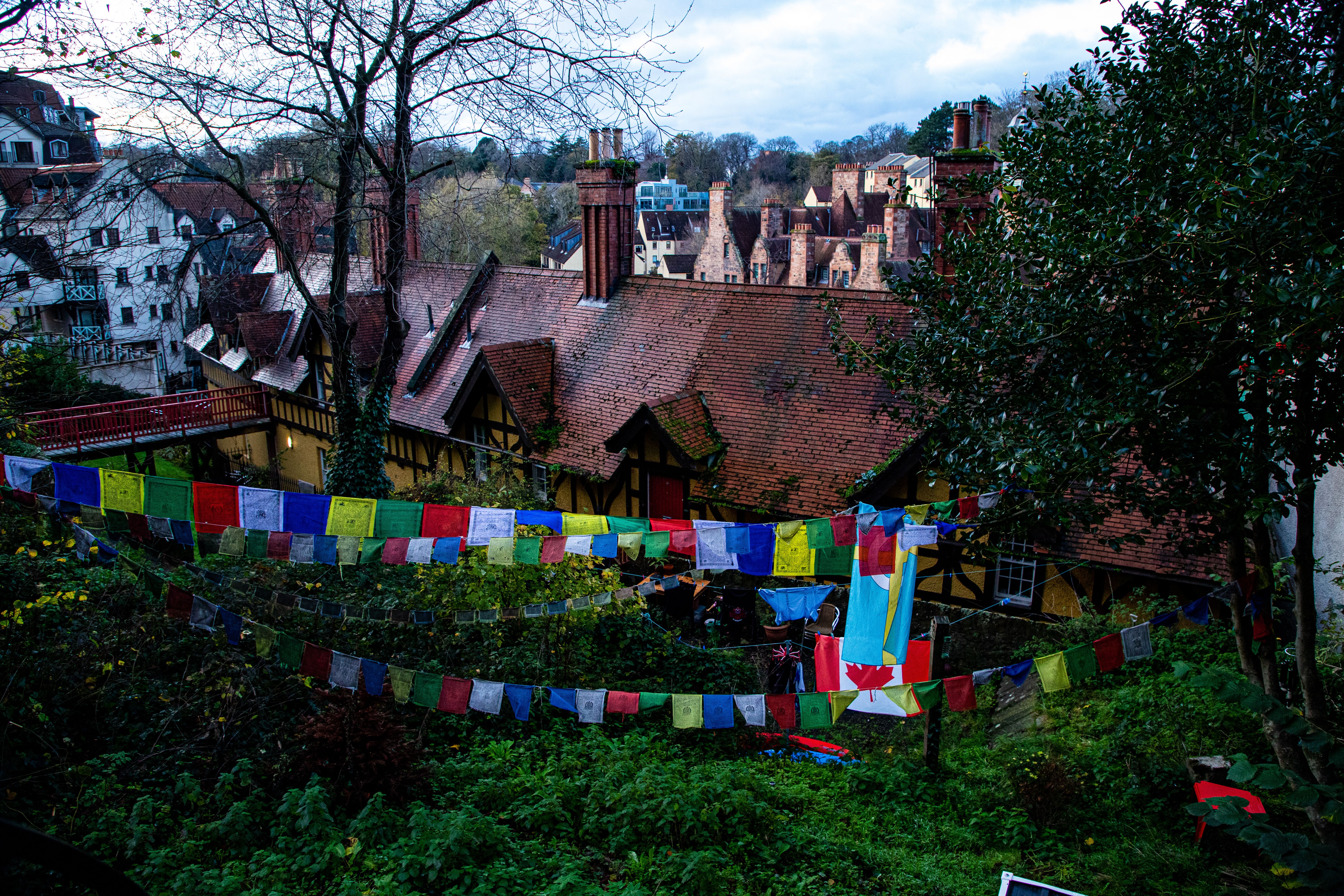 Colorful Flags Hanging in a Town · Free Stock Photo