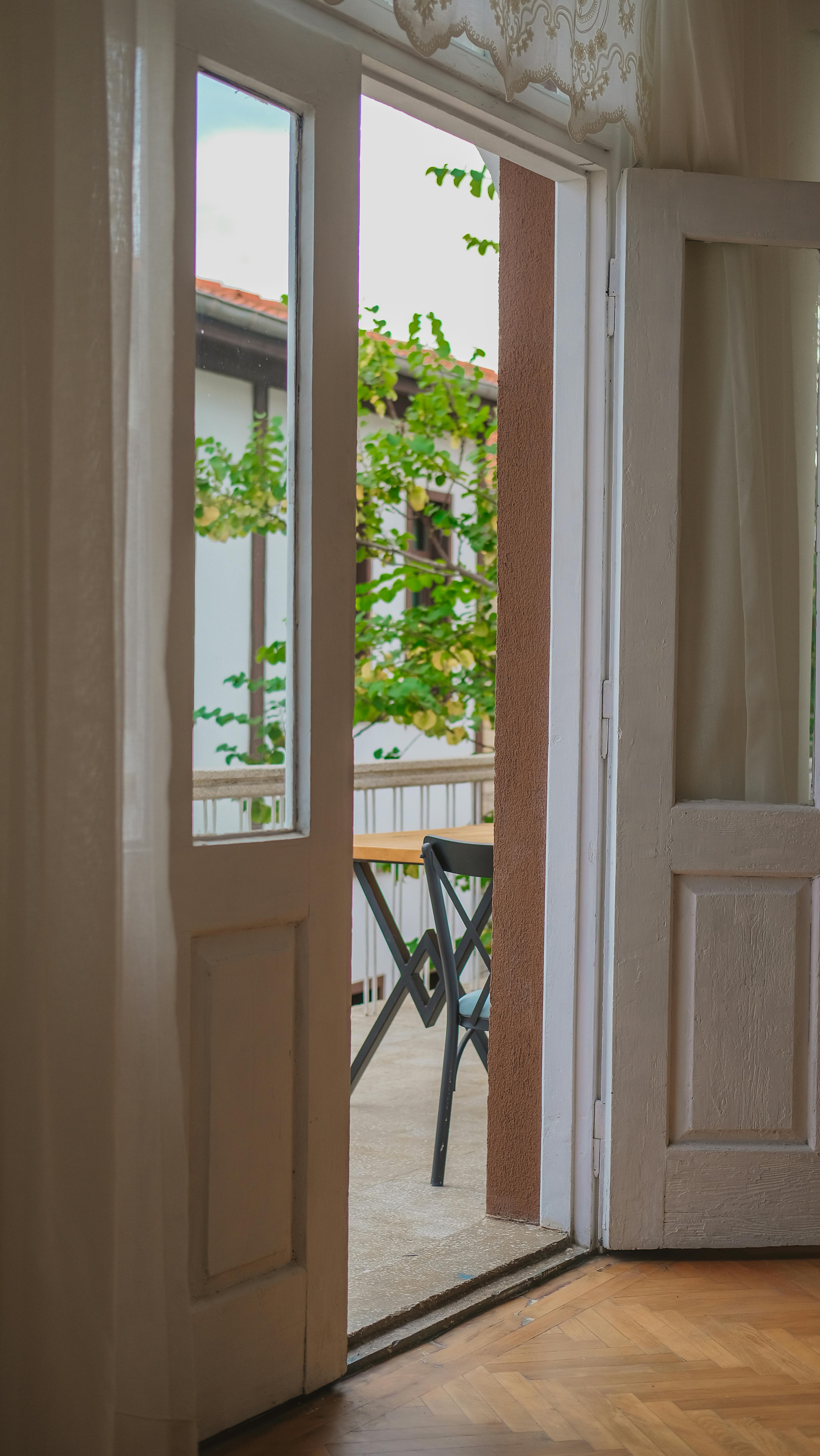 Photo of a White Wooden Balcony Door · Free Stock Photo