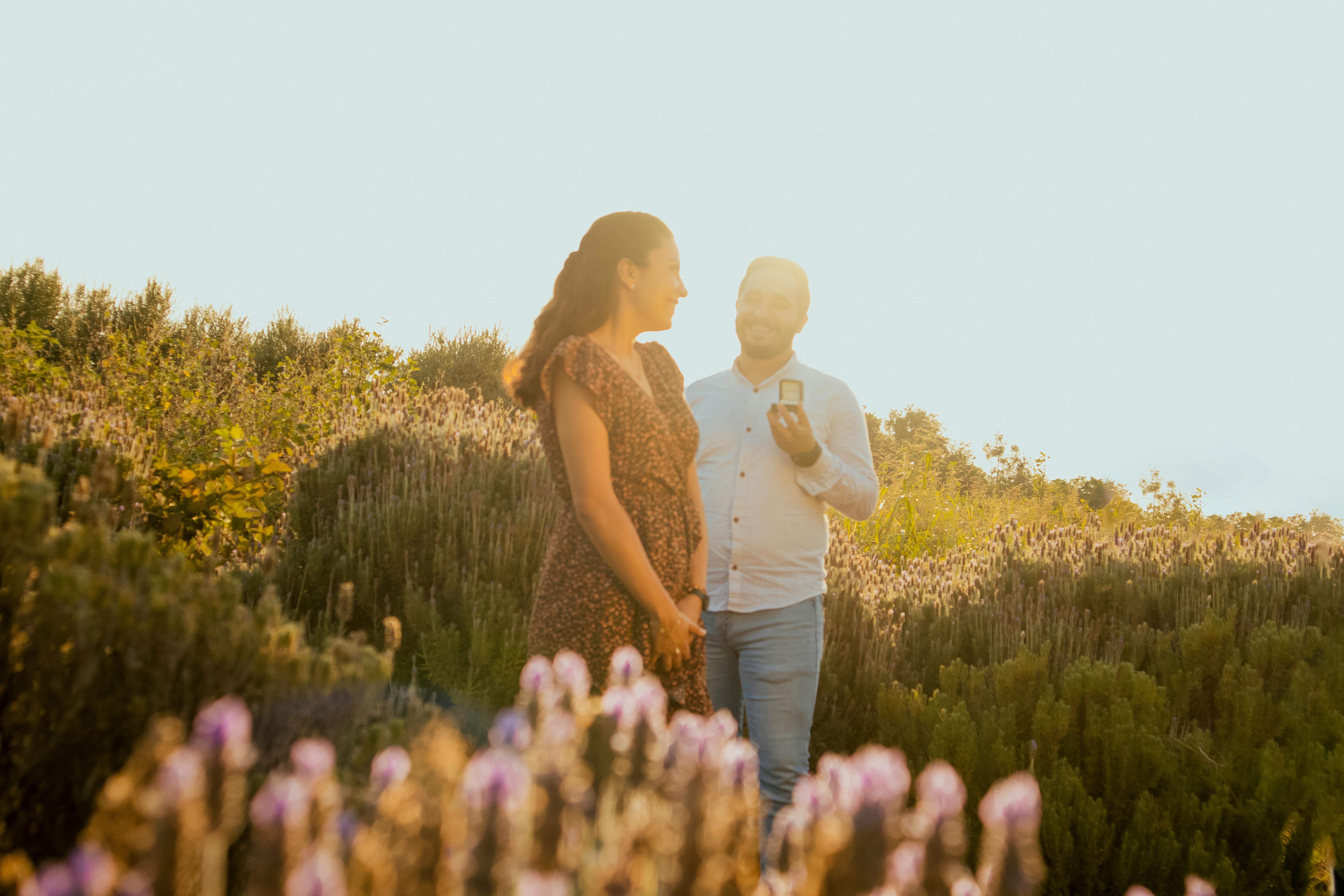 Man Carrying His Girlfriend over His Shoulder · Free Stock Photo