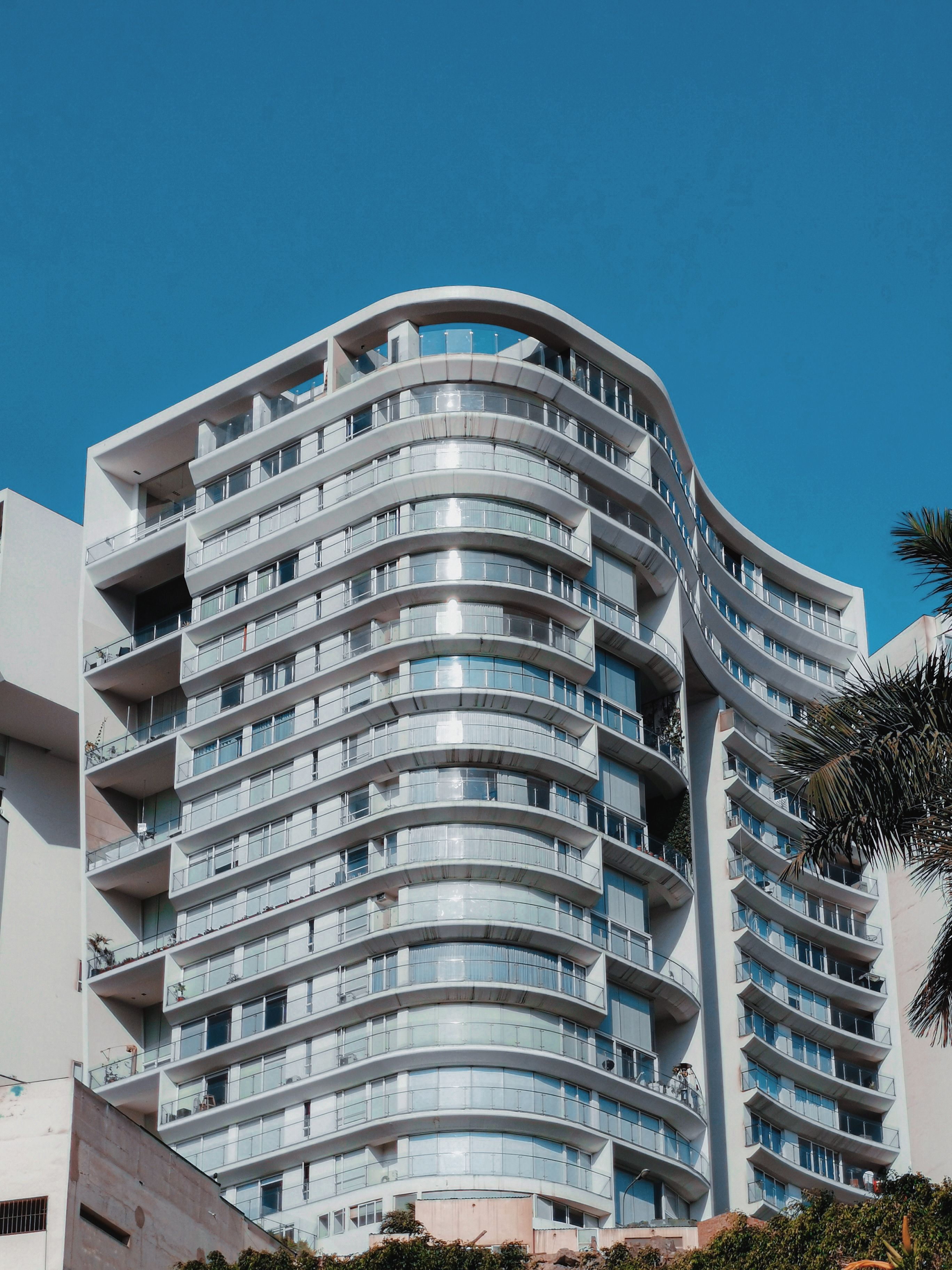 Modern Urban Architecture with Palm Trees · Free Stock Photo
