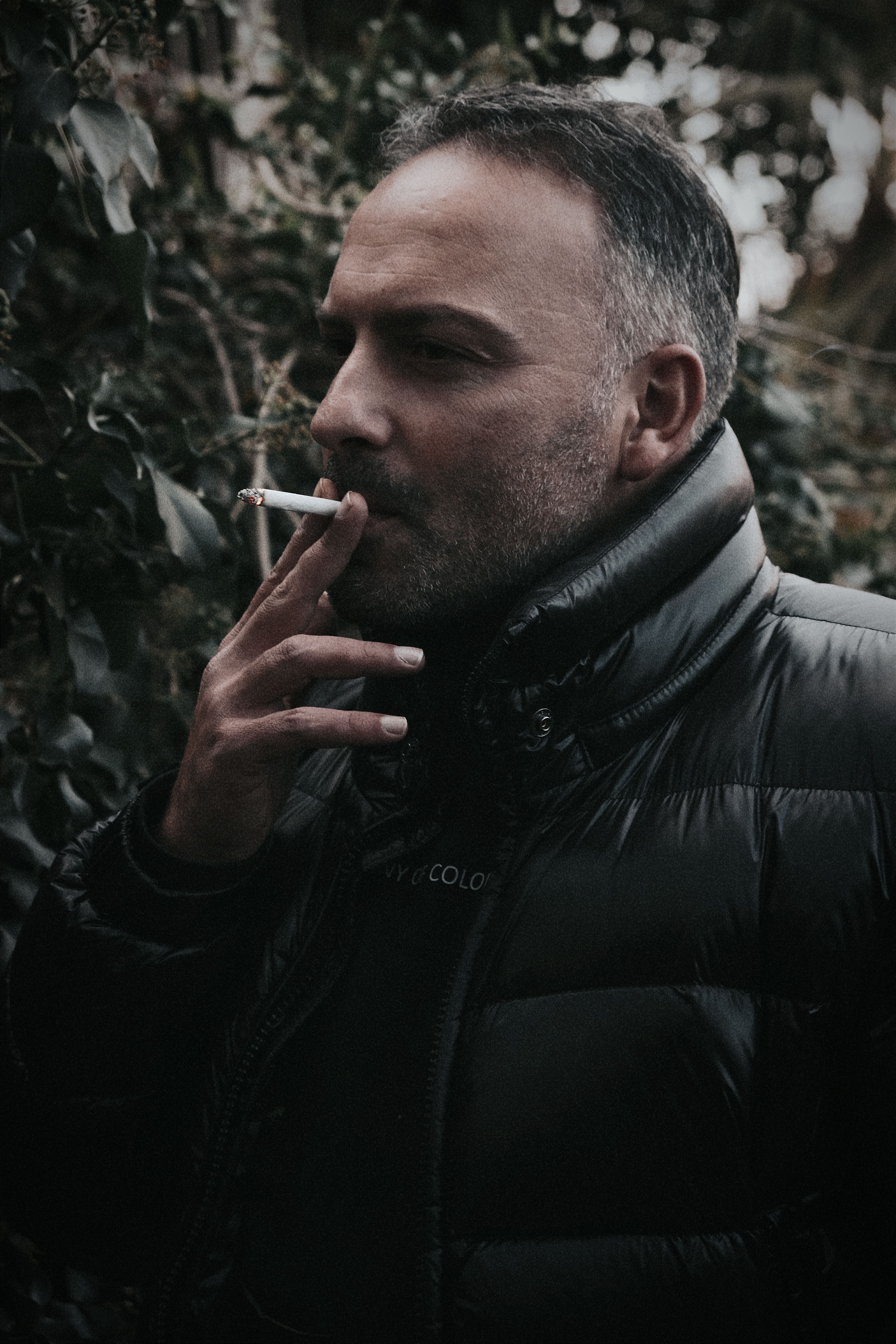 Man Sitting and Smoking · Free Stock Photo
