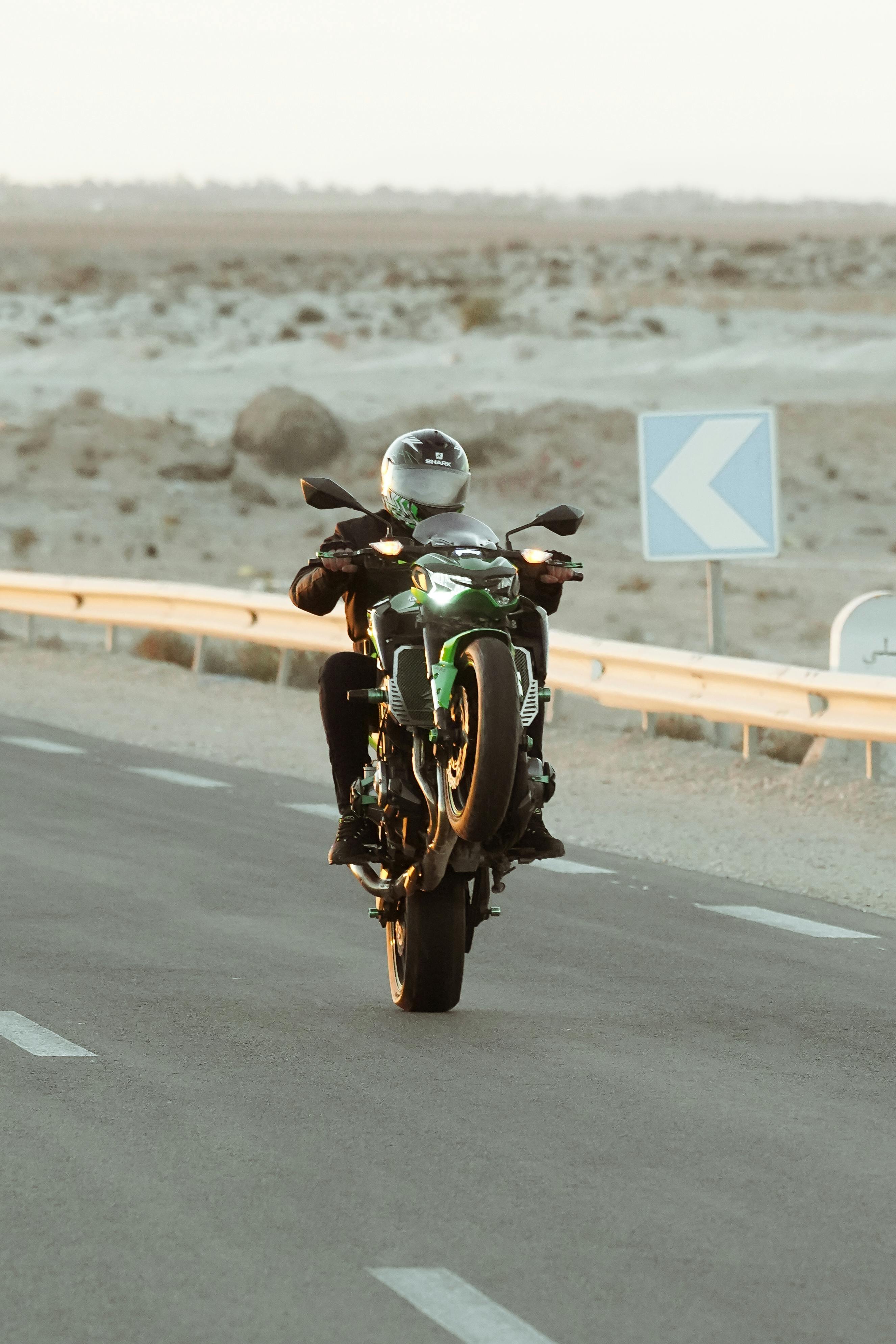 A Man Riding Motorcycle on the Road · Free Stock Photo