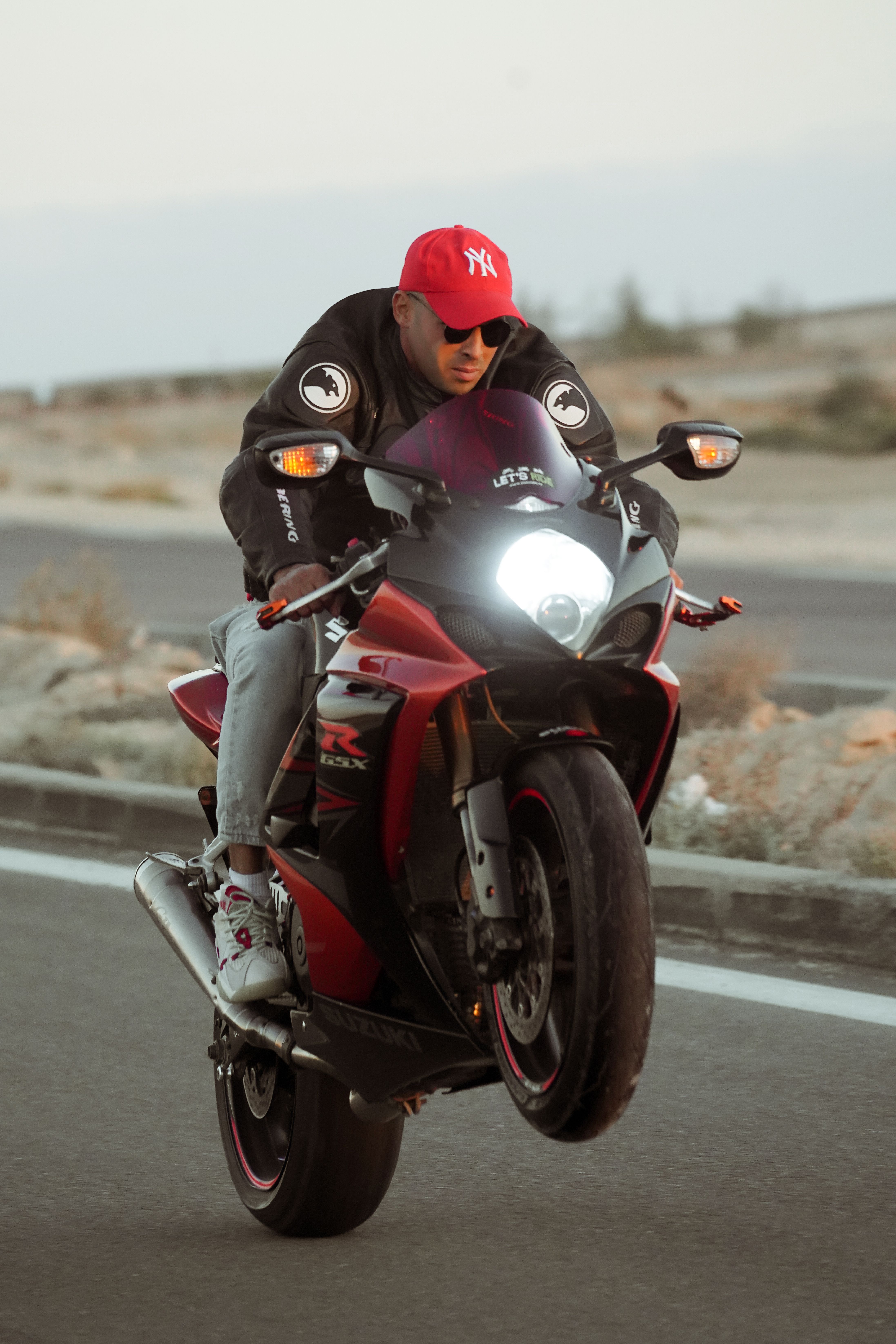 Man Riding a Motorcycle on One Wheel · Free Stock Photo