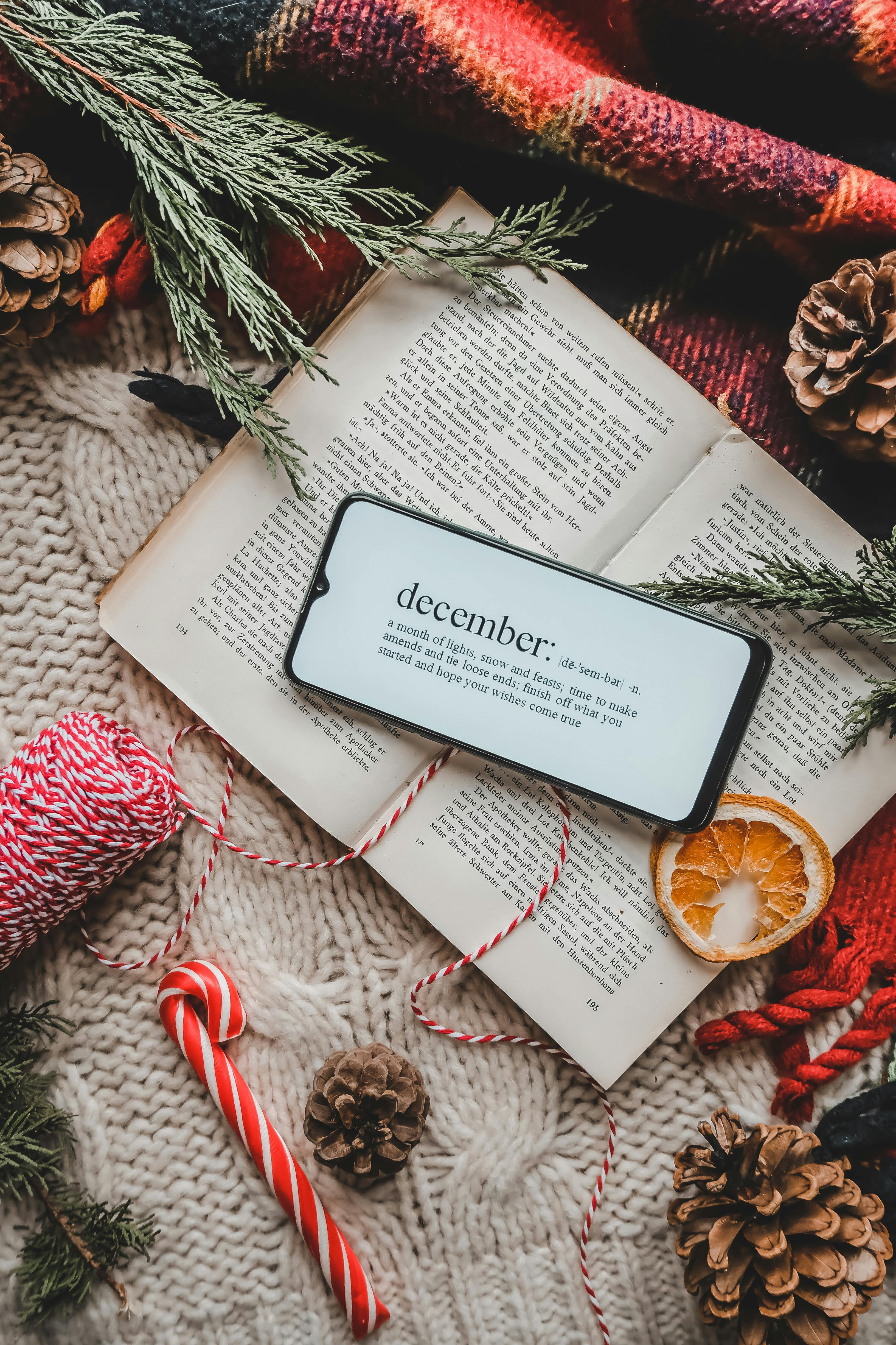 A Smartphone on the Open Book · Free Stock Photo