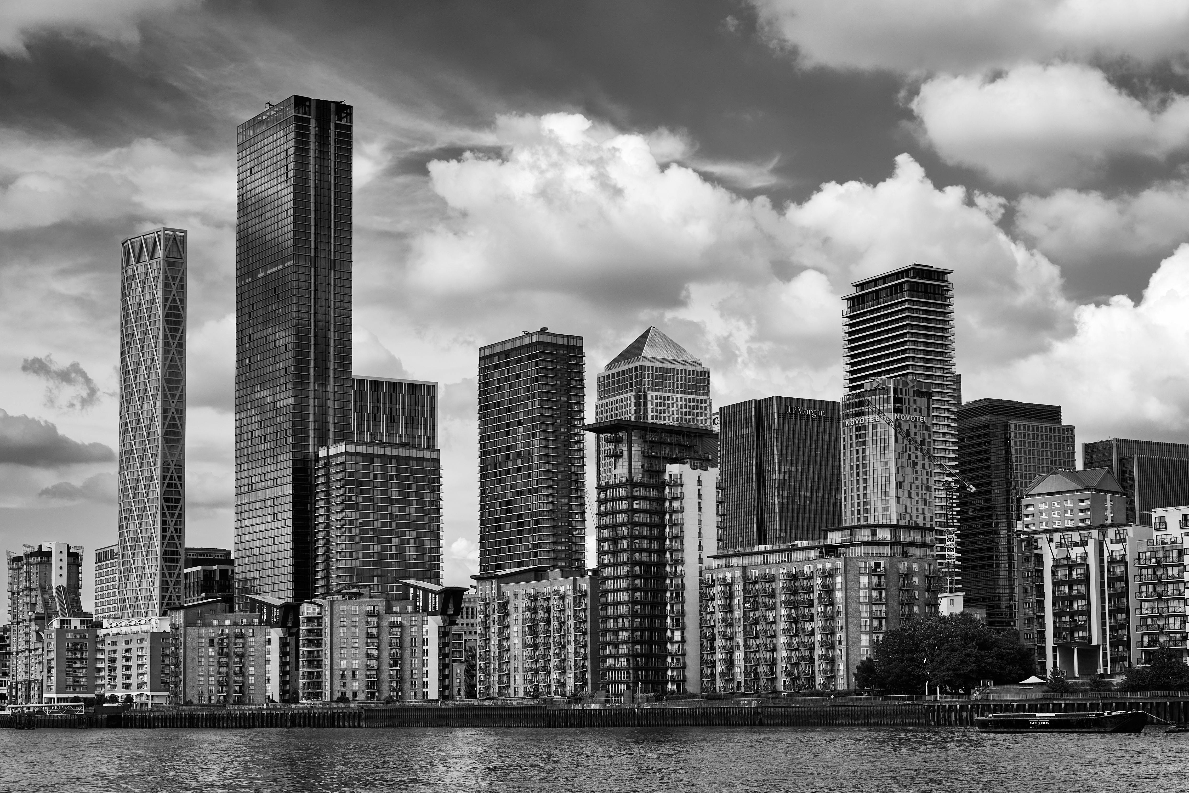 Grayscale Photo of Concrete Buildings · Free Stock Photo