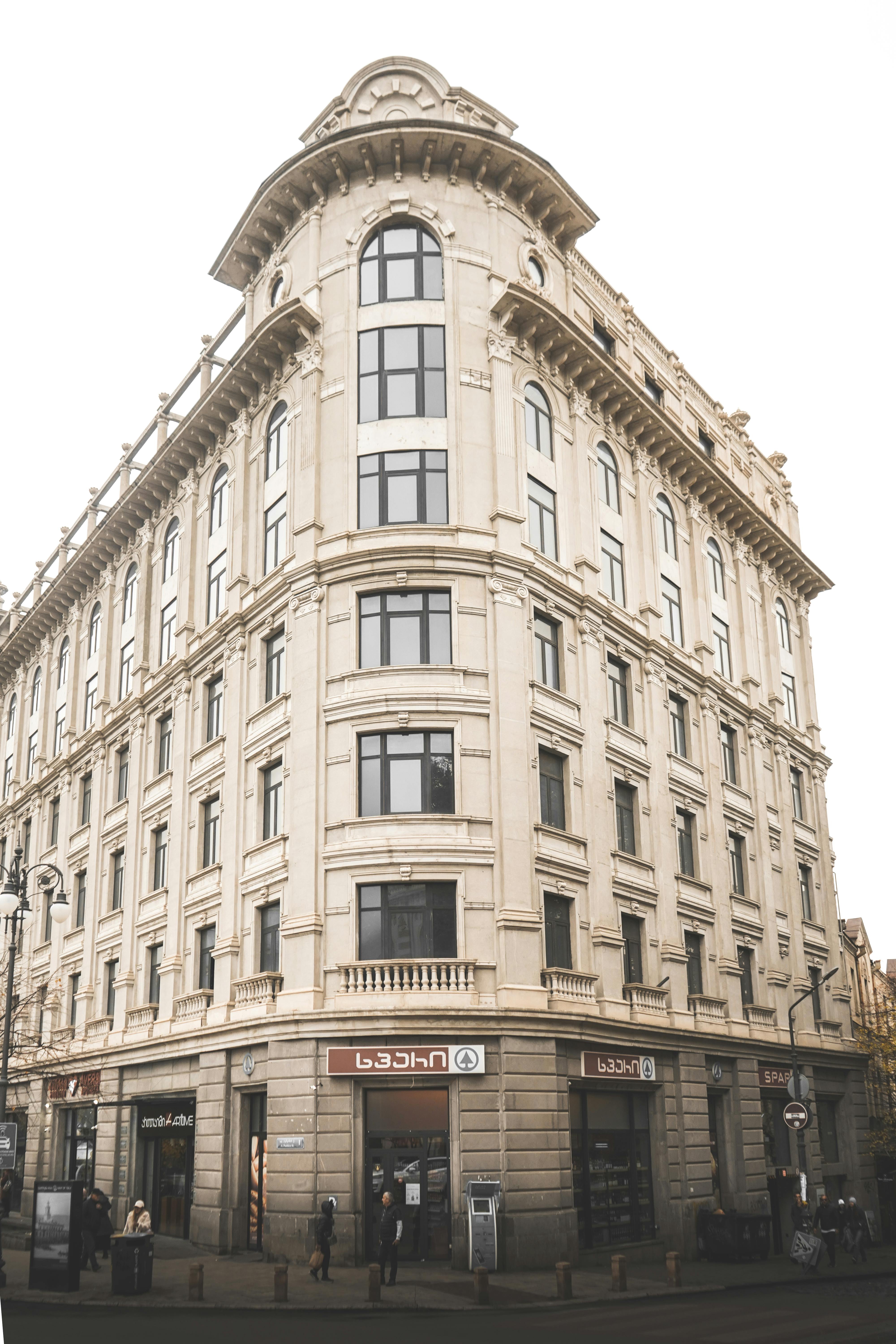 Facade of Beige Concrete Bulding · Free Stock Photo