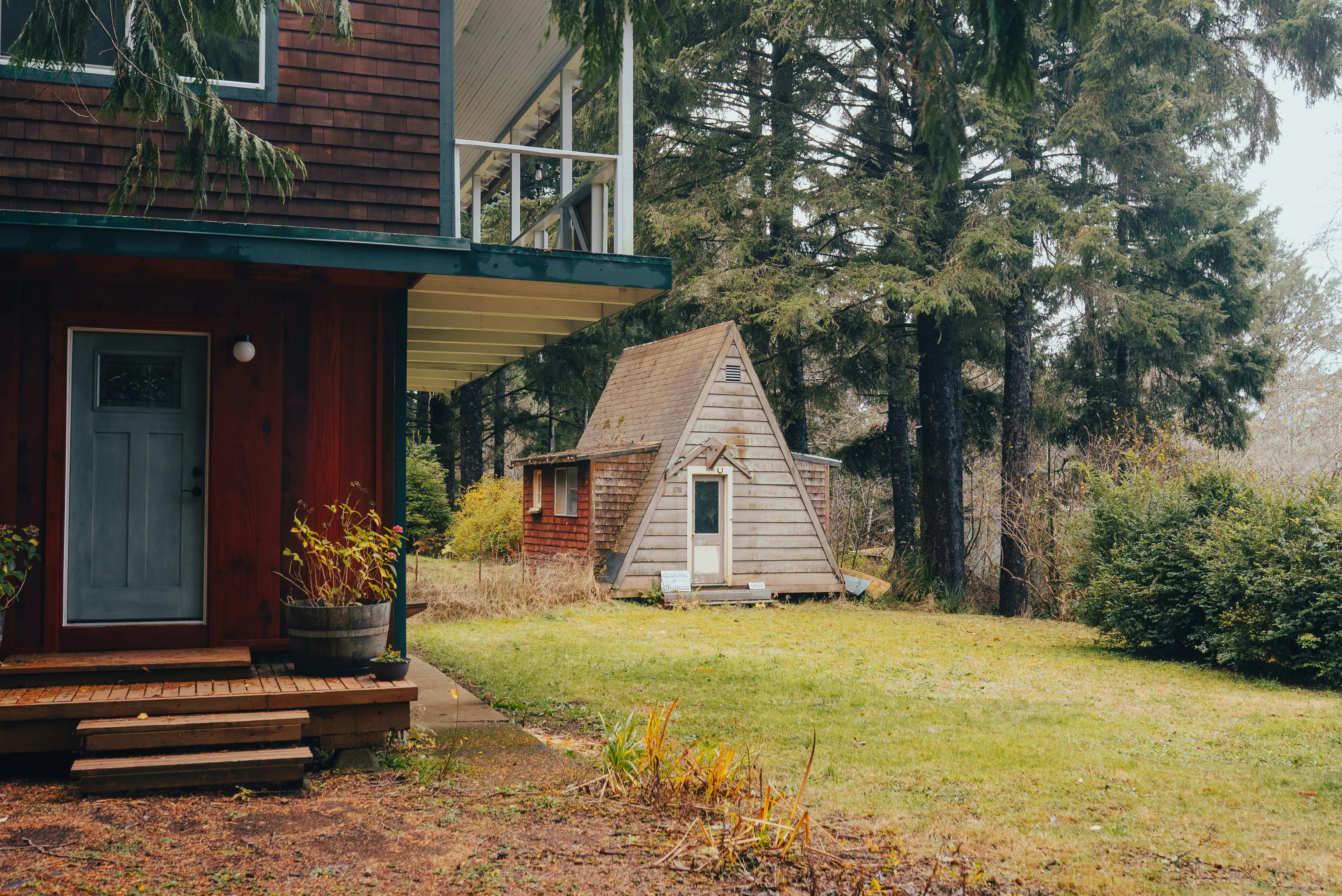 Photograph of a Wooden Shabby House · Free Stock Photo