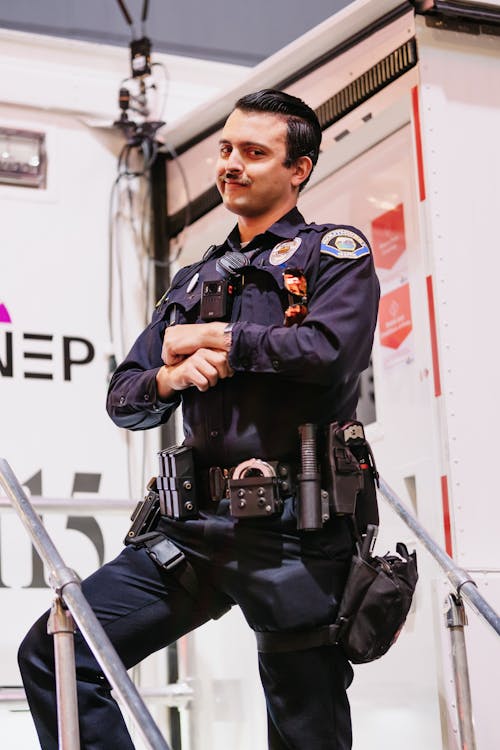 Standing Policeman Smiling · Free Stock Photo Standing Policeman Smiling · Free Stock Photo