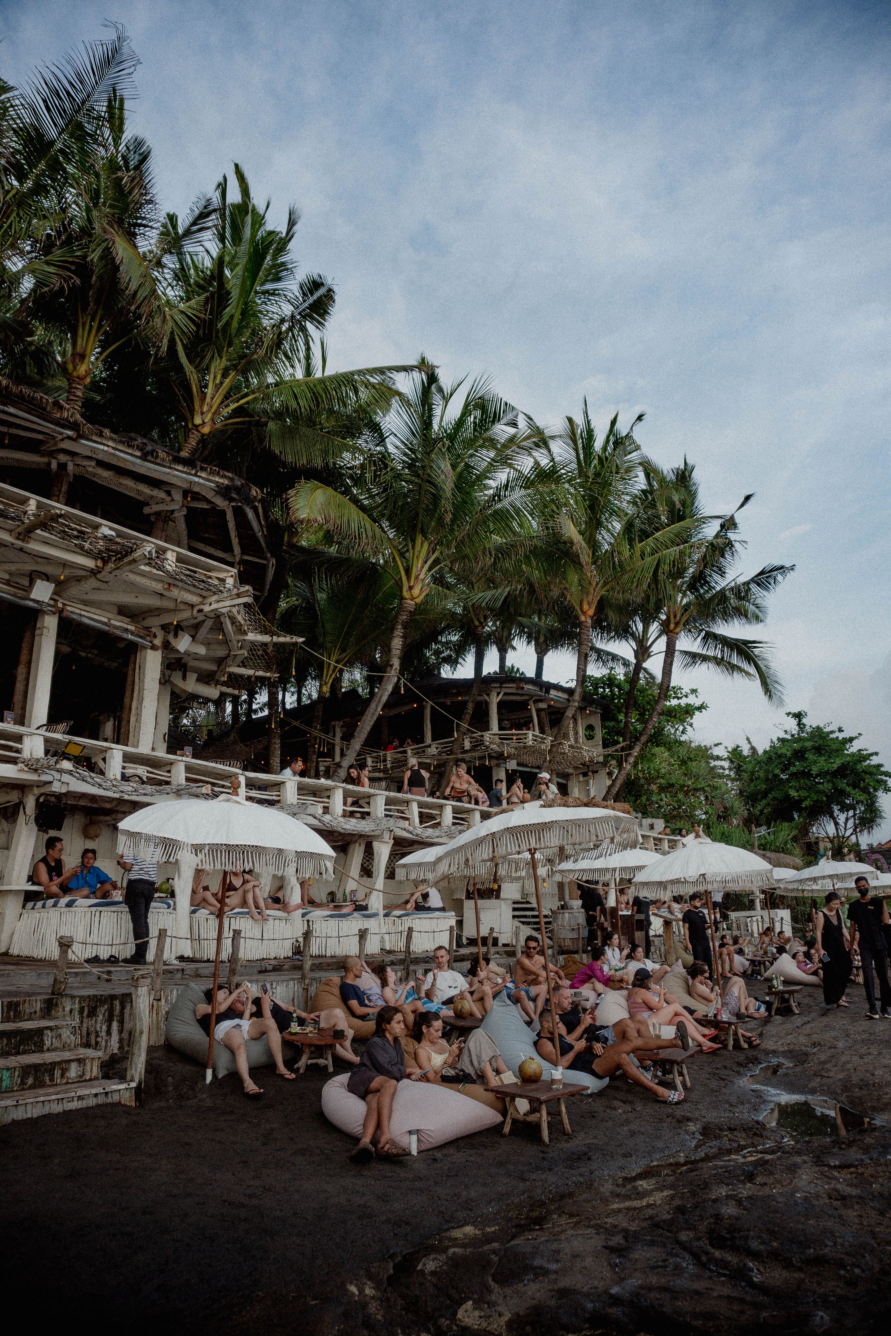 People Relaxing on Beach in Tropical Landscape · Free Stock Photo