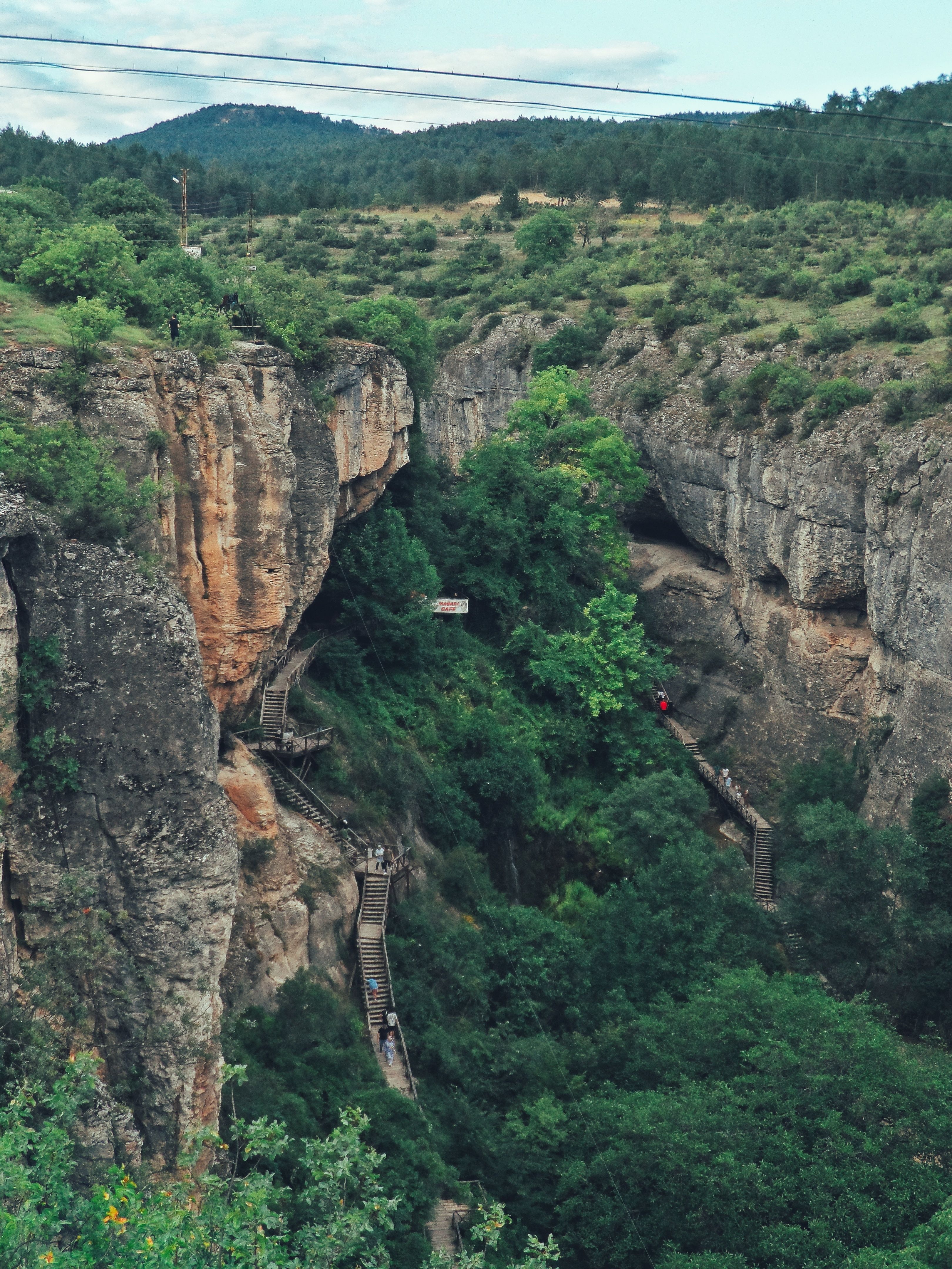 Tourist Climbing Steps in Mountains · Free Stock Photo