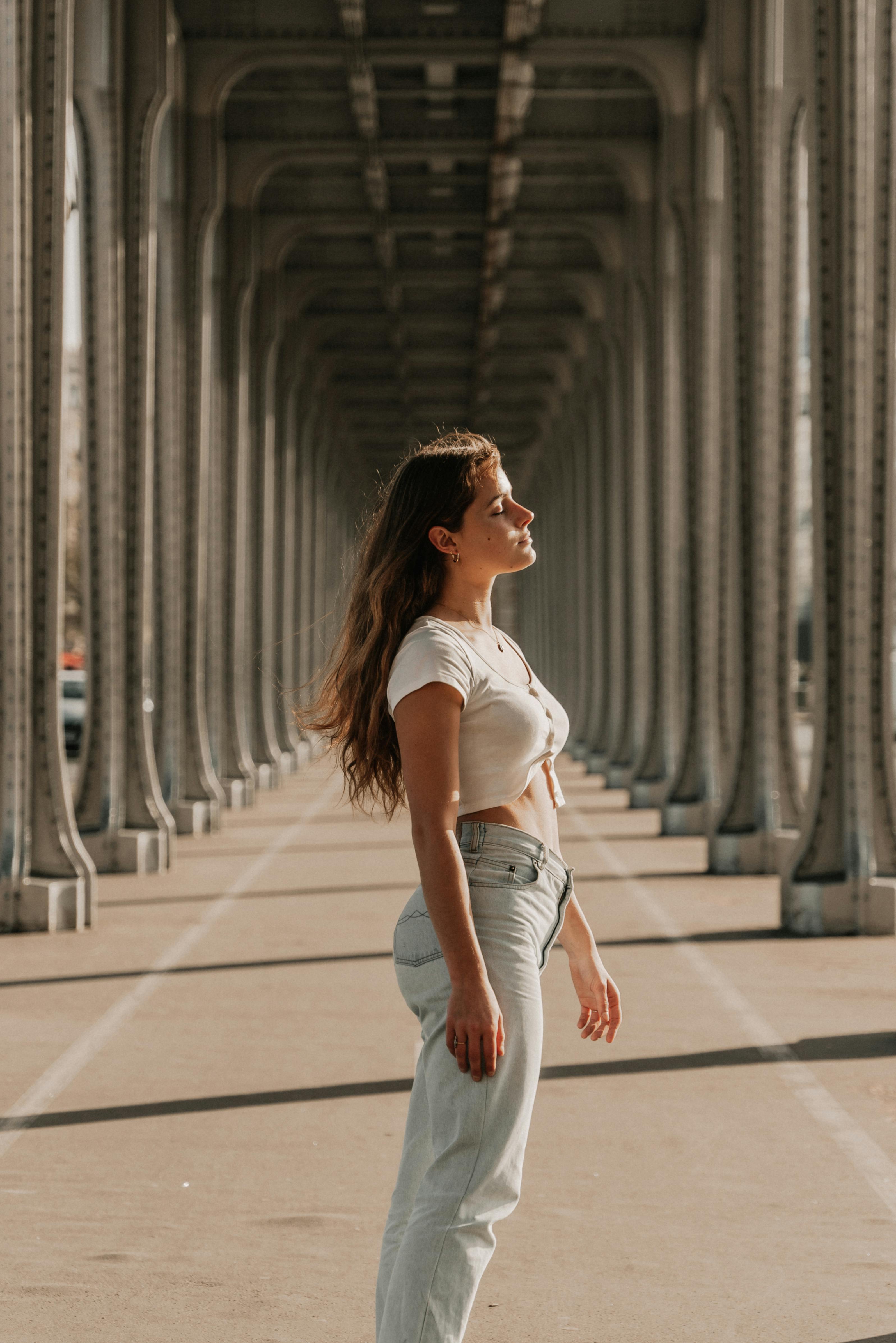 Woman Standing by a Handrail · Free Stock Photo