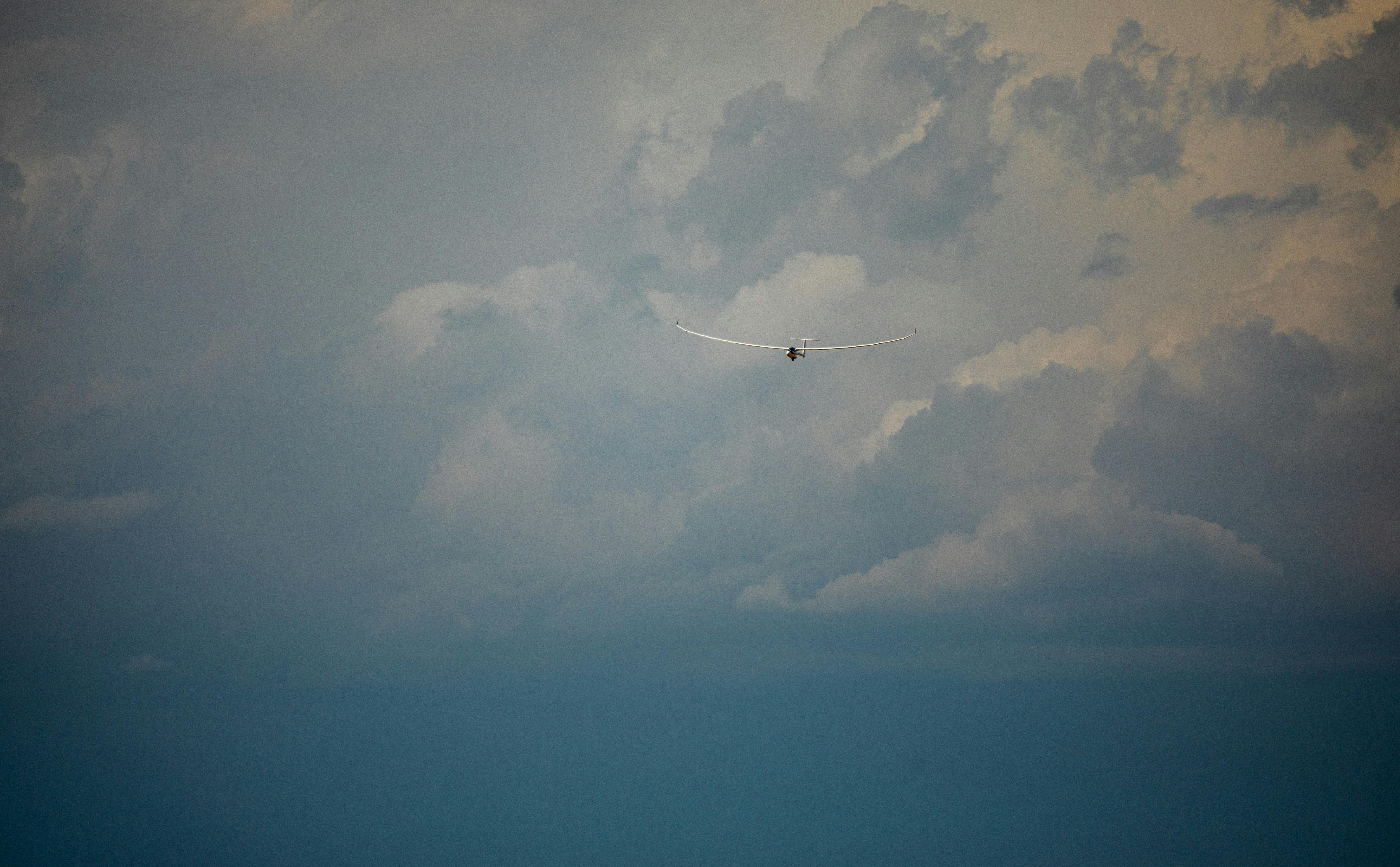 Airplane in the Clouds · Free Stock Photo