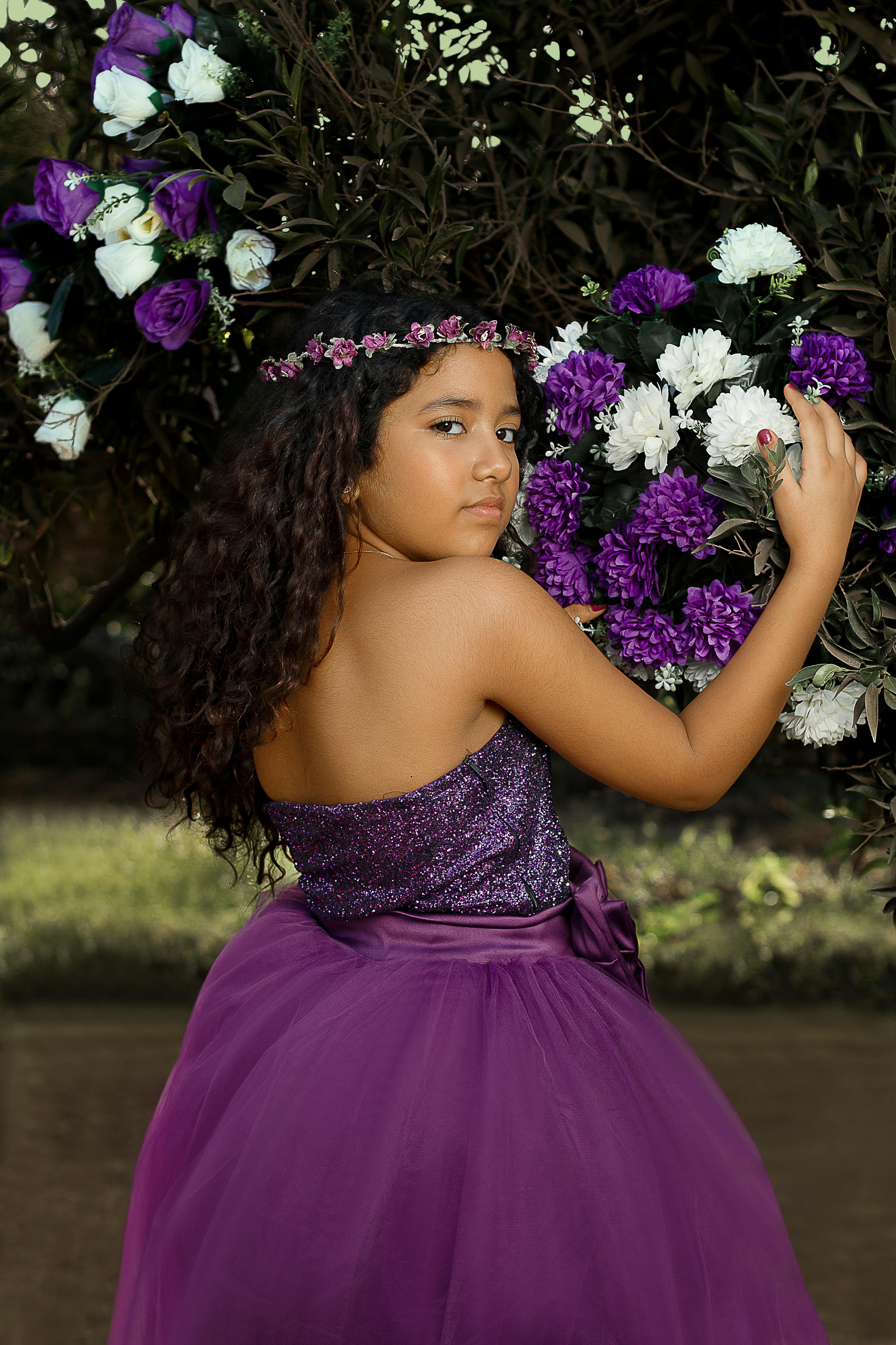 Cute Girl in Violet Dress Standing Near White and Violet Flowers · Free ...